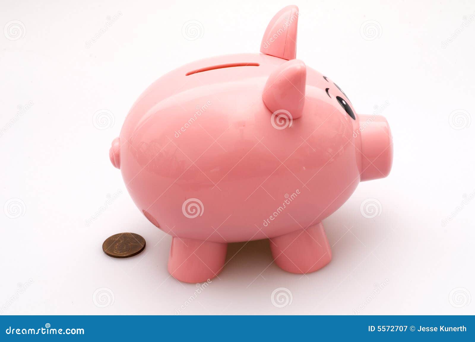 Piggy Bank Pooping a Penny stock image. Image of isolated - 5572707