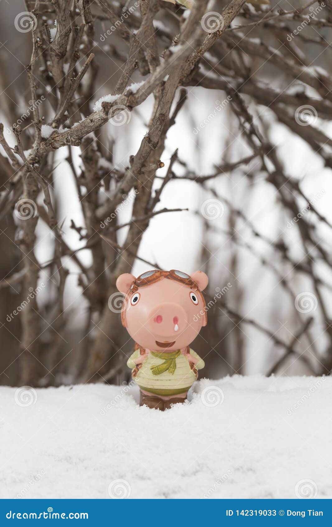 Piggy dolls in the snow stock image. Image of snow, winter - 142319033