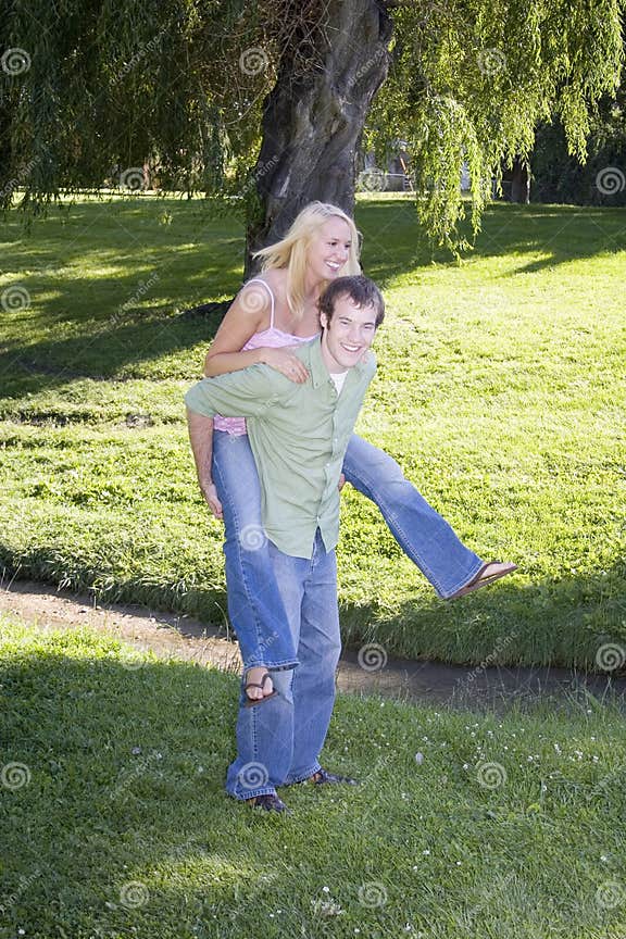 Piggyback Ride stock photo. Image of girl, blonde, piggy - 1311316