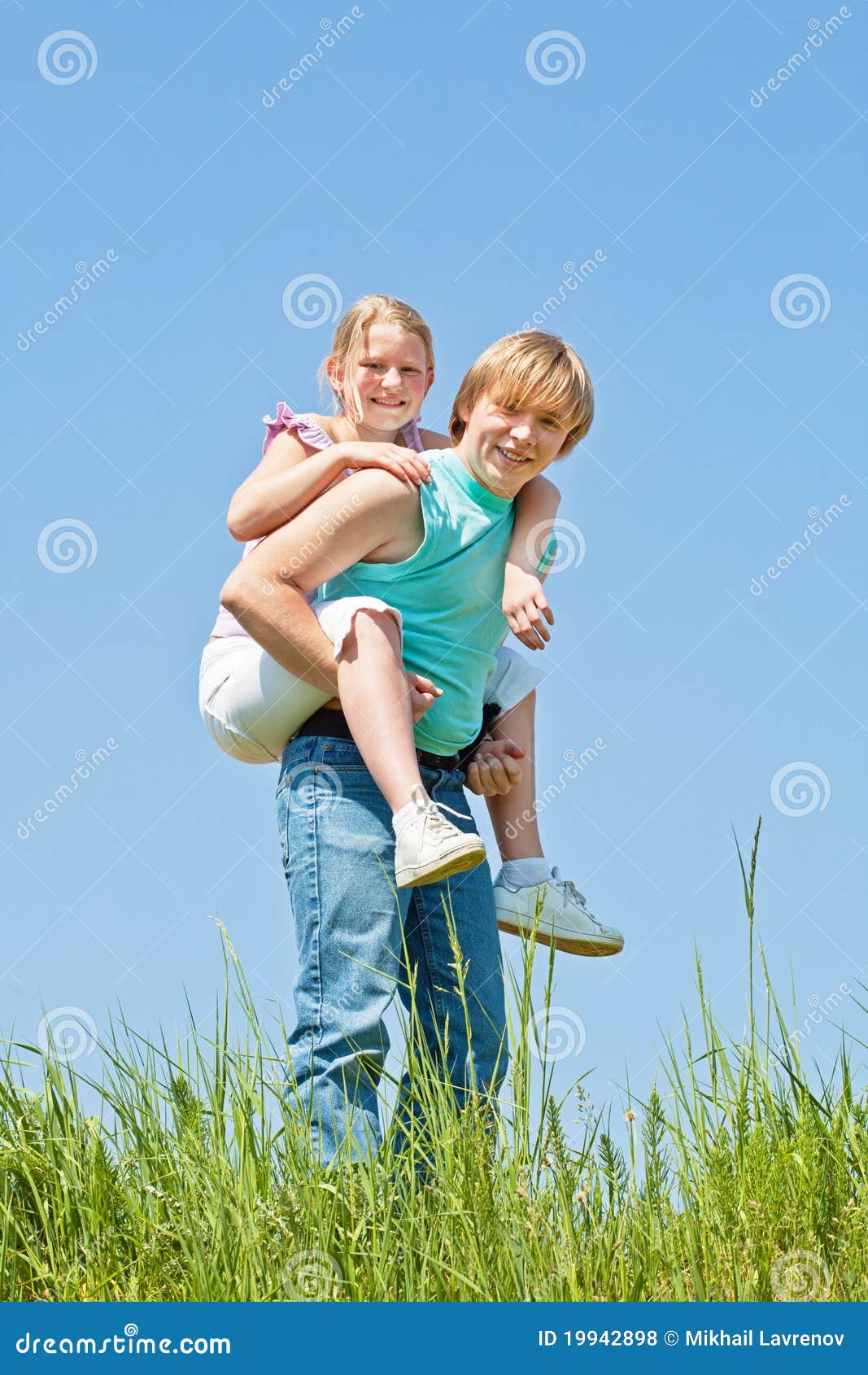 Piggyback ride stock photo. Image of casual, together - 19942898