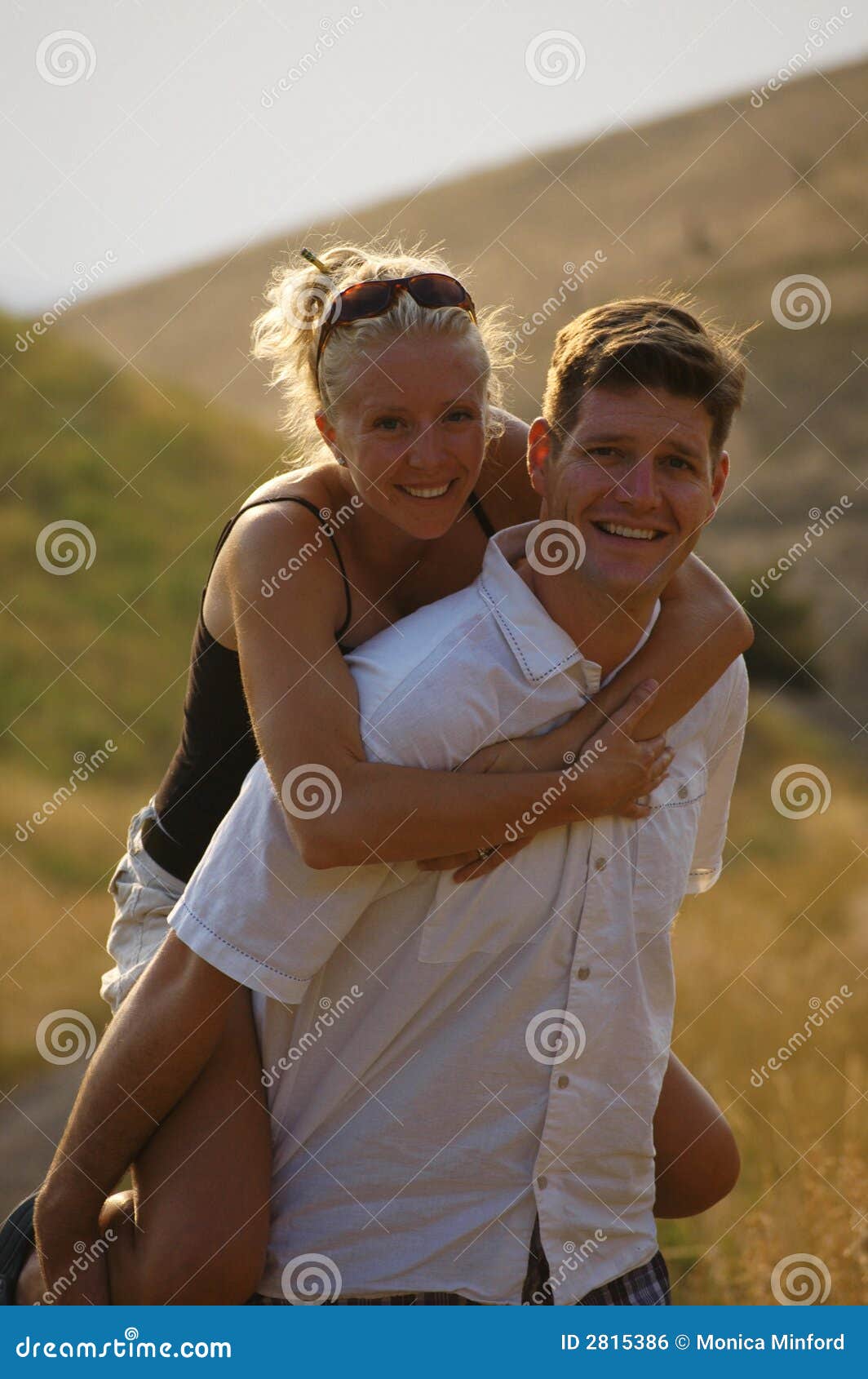 Piggyback Ride stock photo. Image of romance, road, hills - 2815386