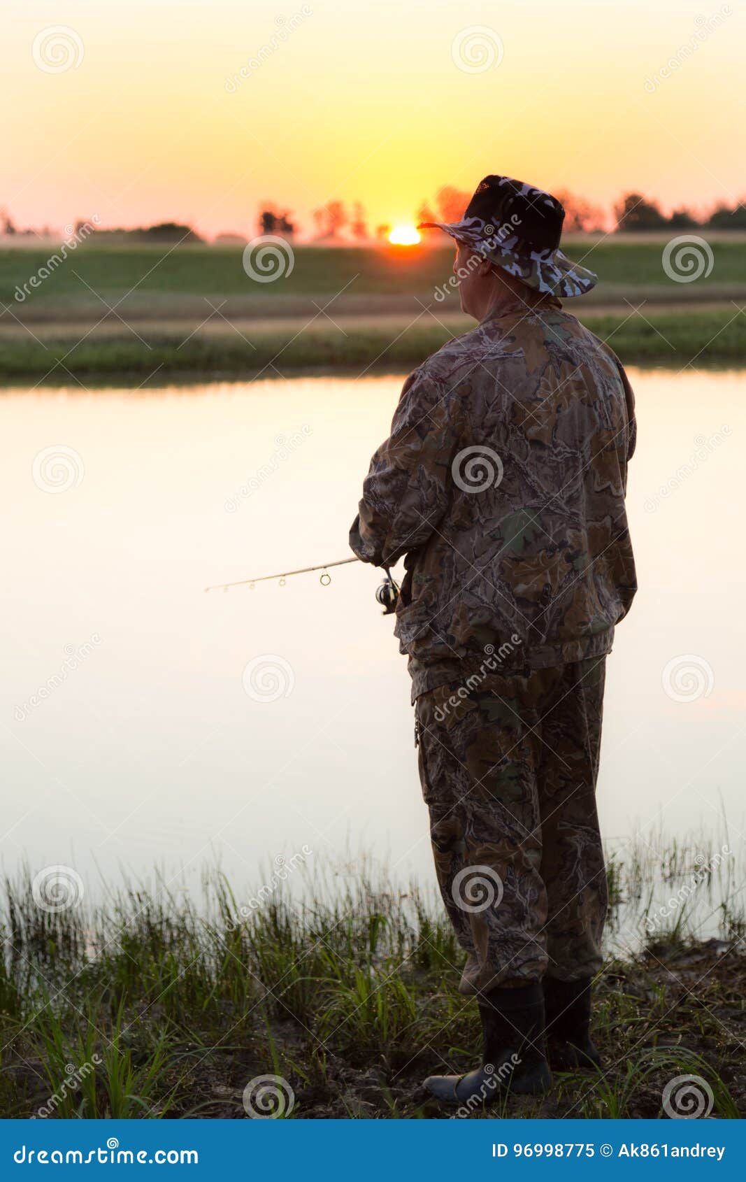 Pike hunter on the river stock image. Image of camera - 96998775