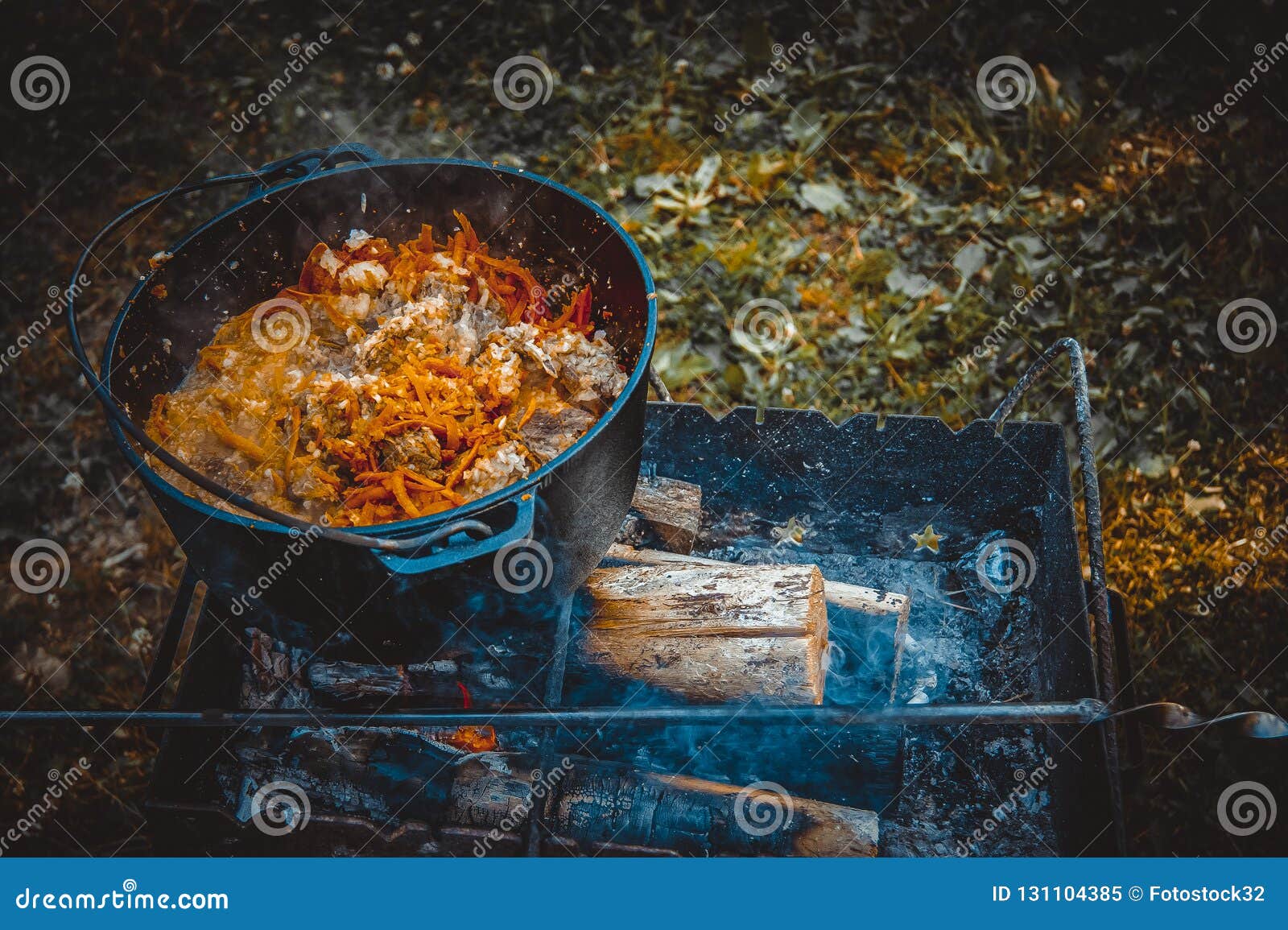 Pilaf in the Cauldron on the Fire Stock Image - Image of black, grass ...