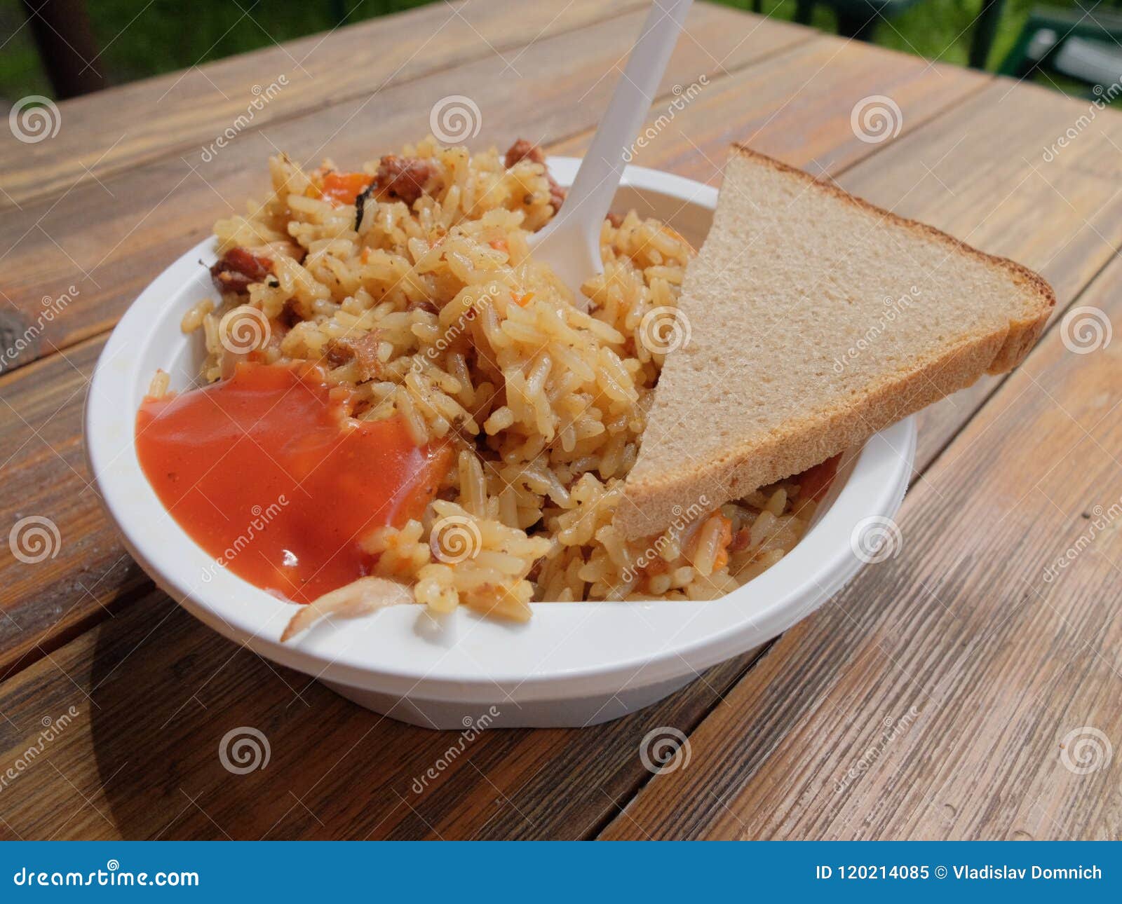 Pilaf with Ketchup and Bread on the Table Stock Image - Image of boards ...