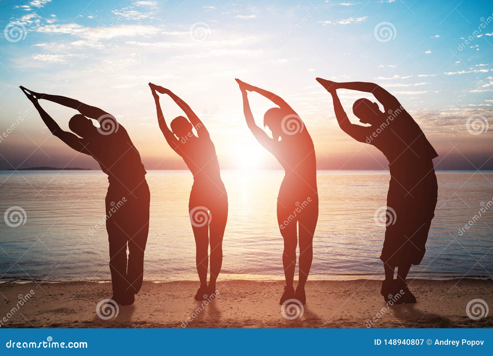 Group of People Doing Stretching Exercise on Beach Stock Image - Image ...