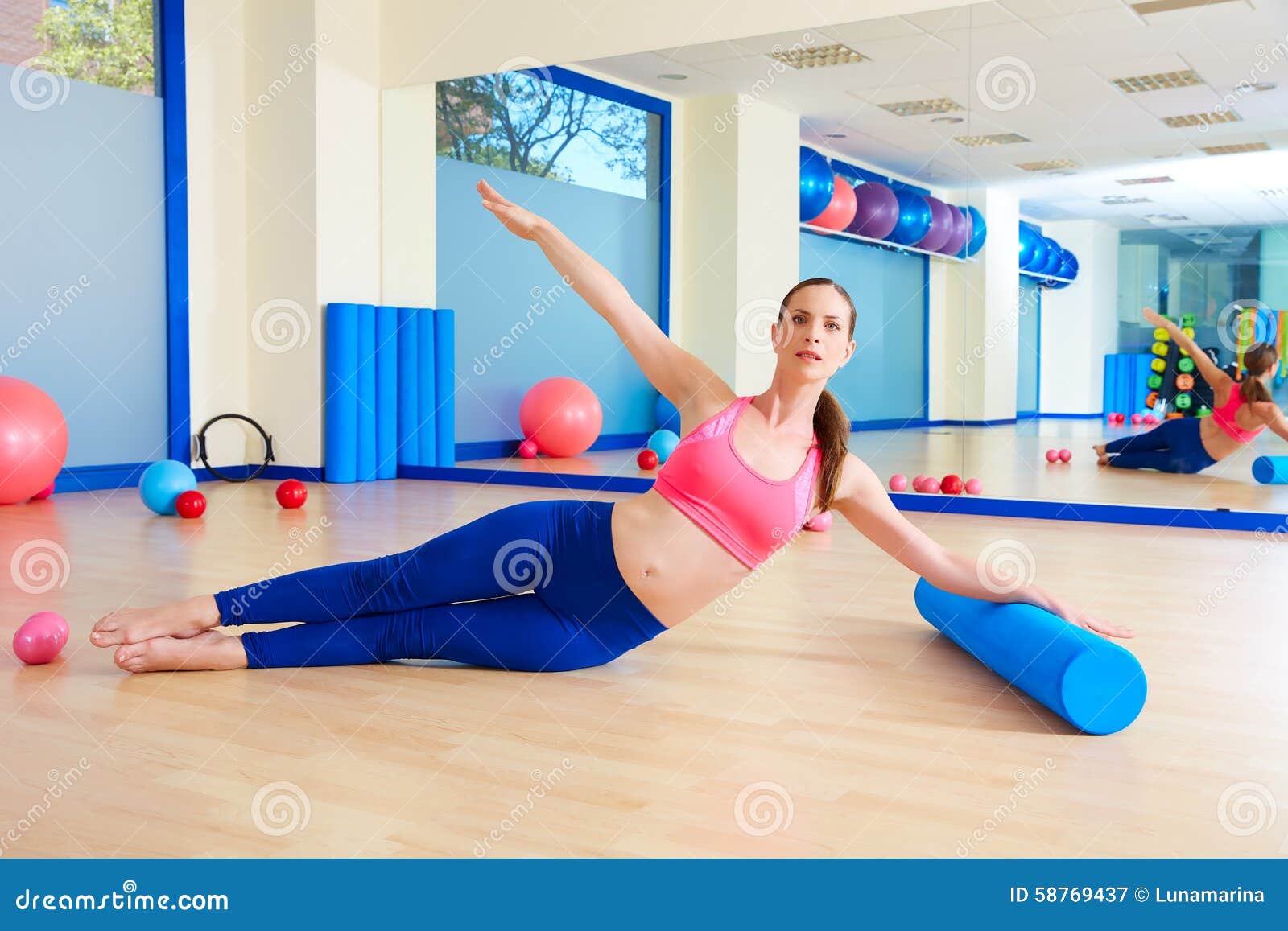 Pilates Woman Roller Exercise Workout at Gym Stock Image - Image of ...