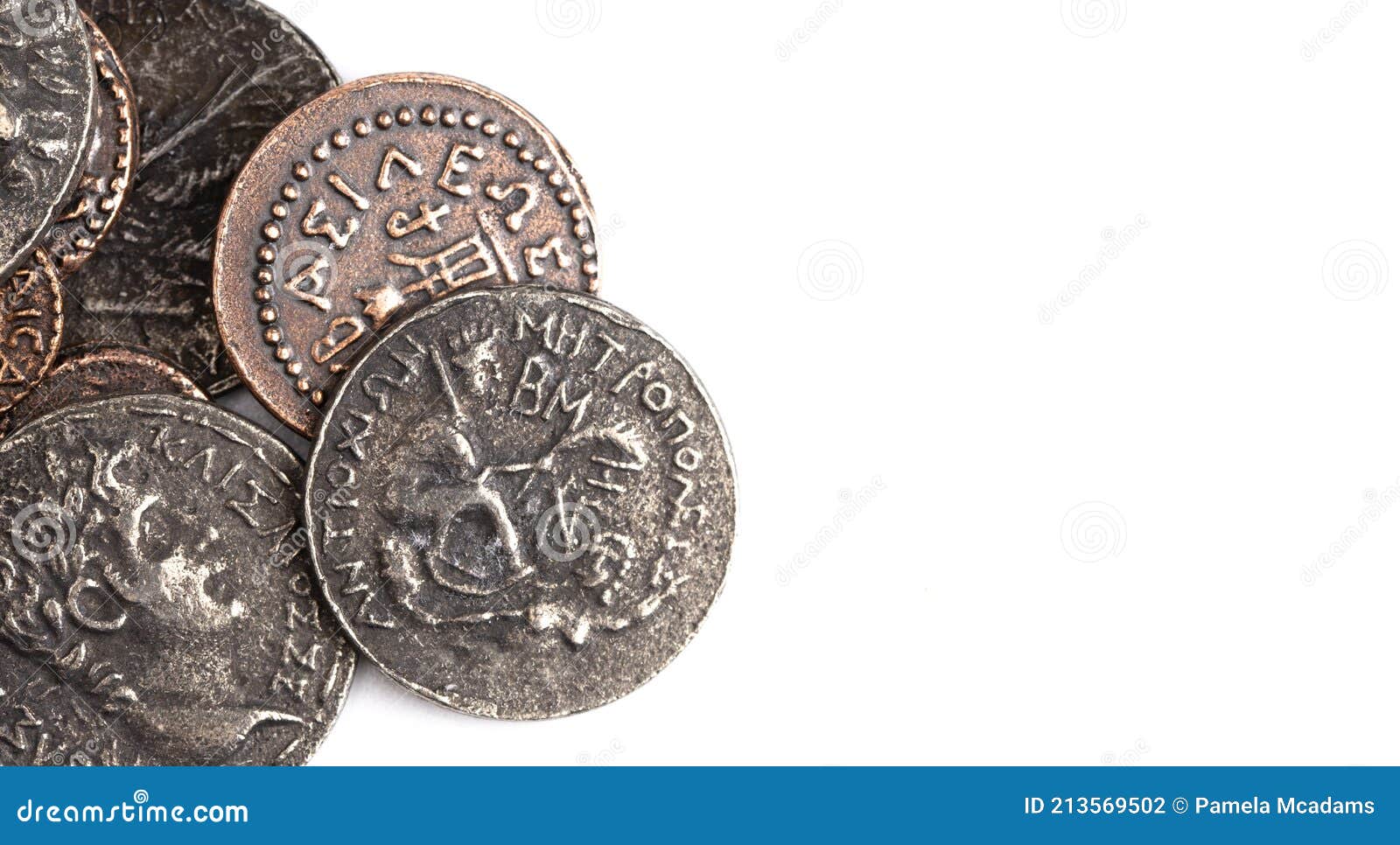 Pile of Ancient Roman Coin Replicas Isolated on a White Background ...