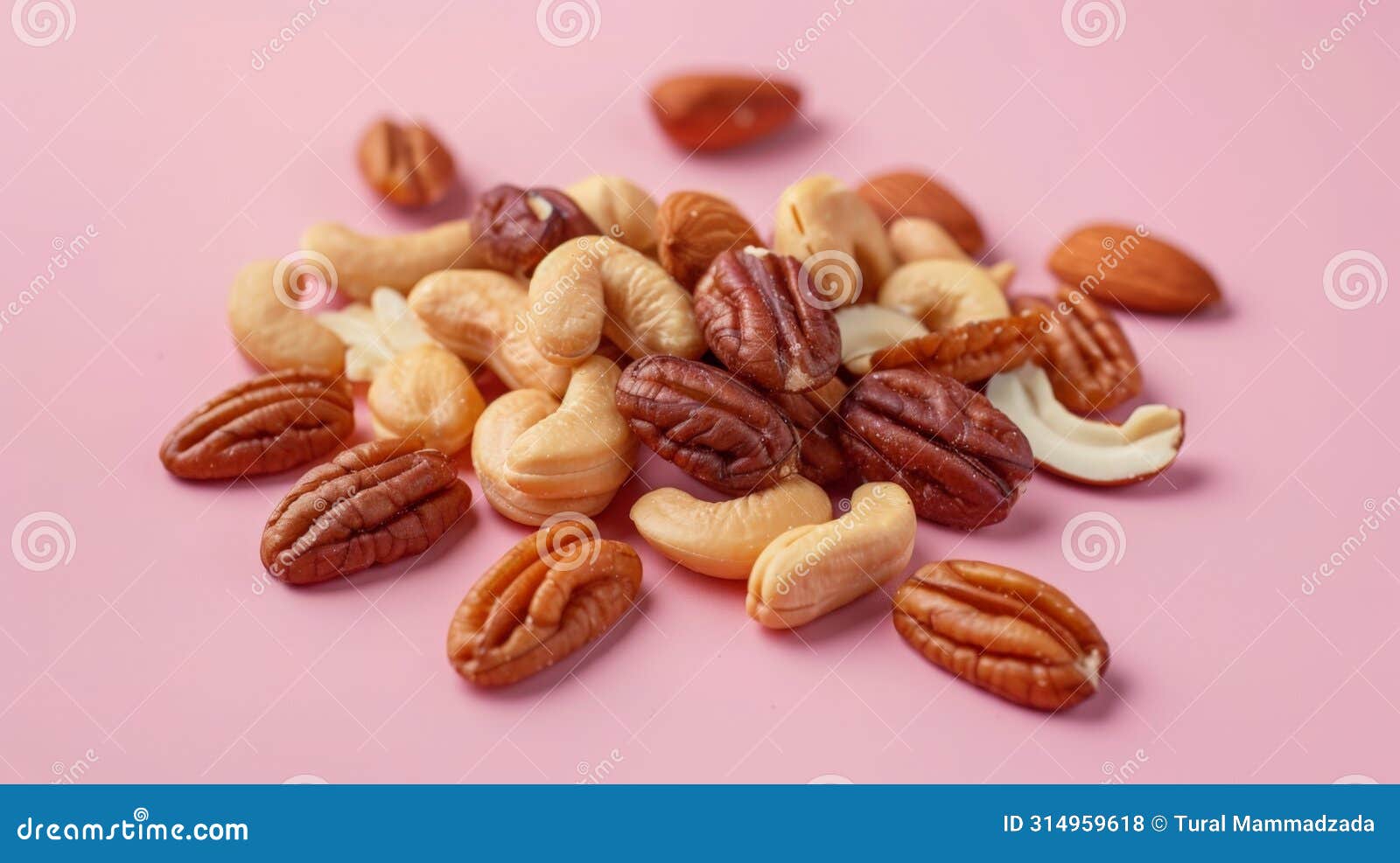 Pile of Assorted Nuts on Pink Background Stock Photo - Image of surface ...