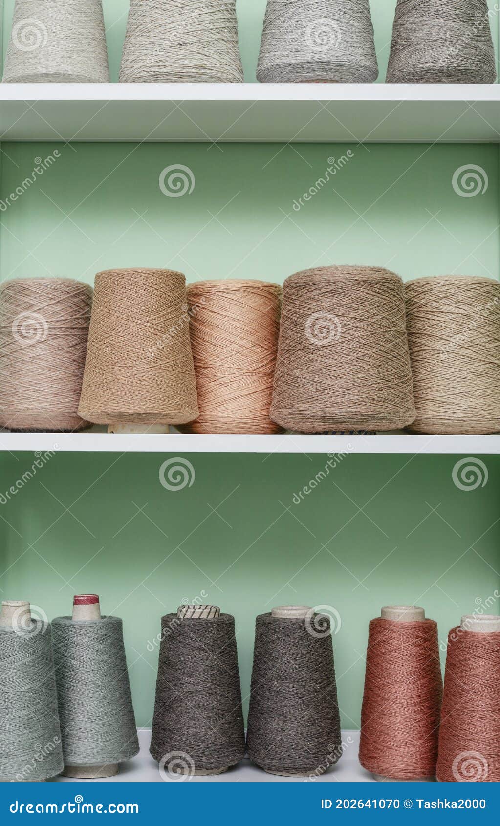Pile of Big Colorful Spools of Yarn on Shelving Stock Photo - Image of ...