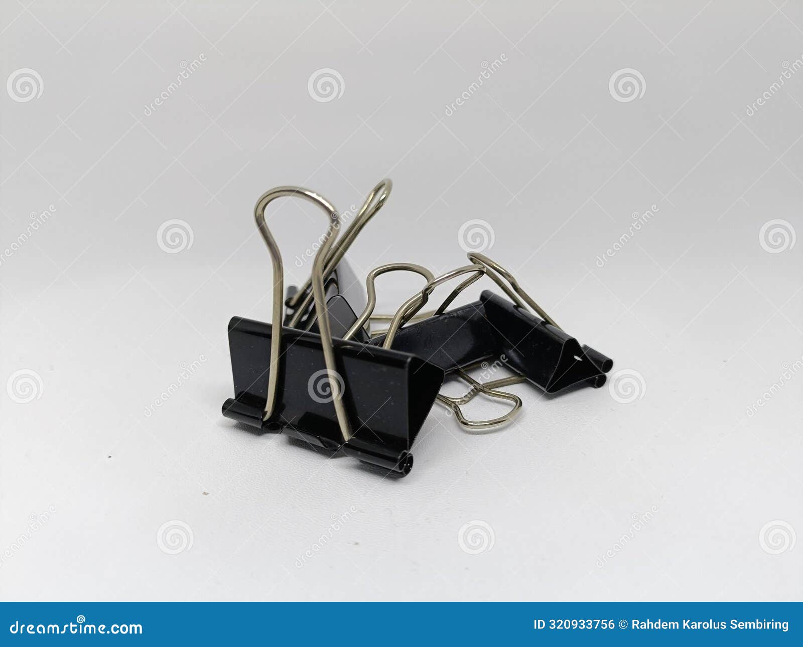 Pile of Black Binder Clips on White Background Stock Photo - Image of ...