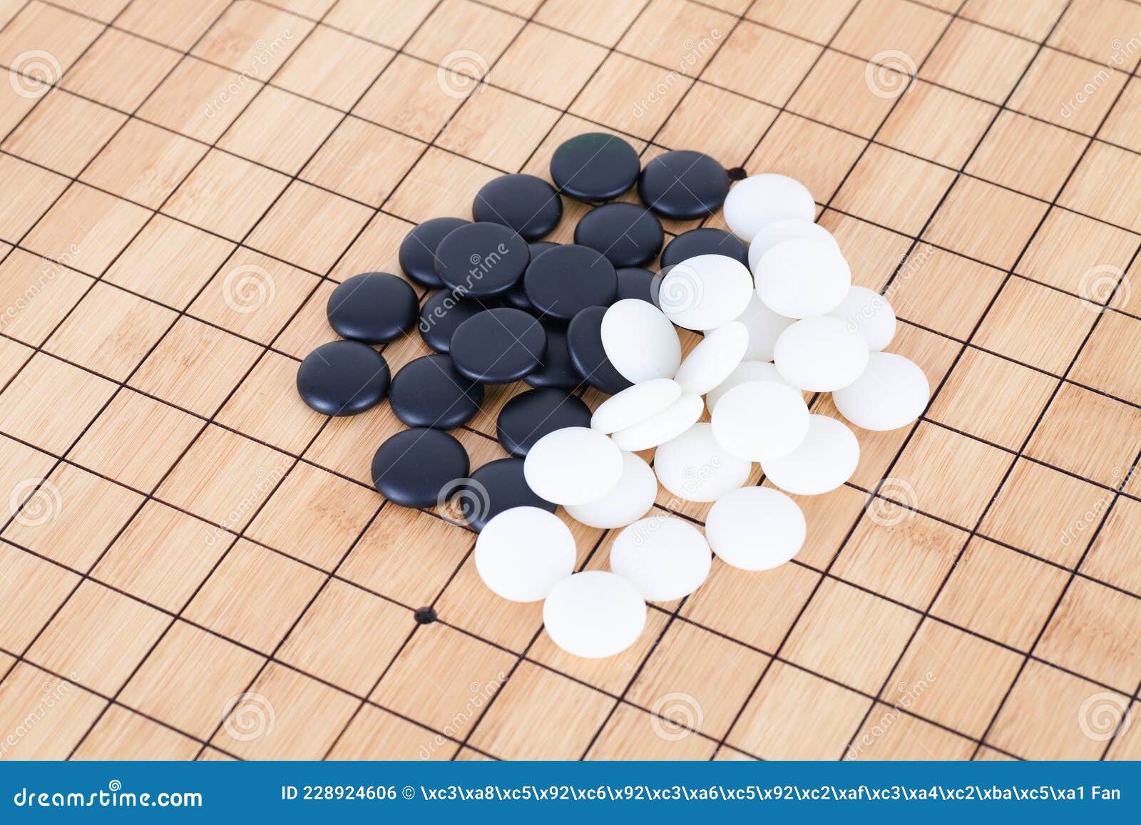 A Pile of Black and White Go Chess Pieces Stock Photo - Image of pile ...