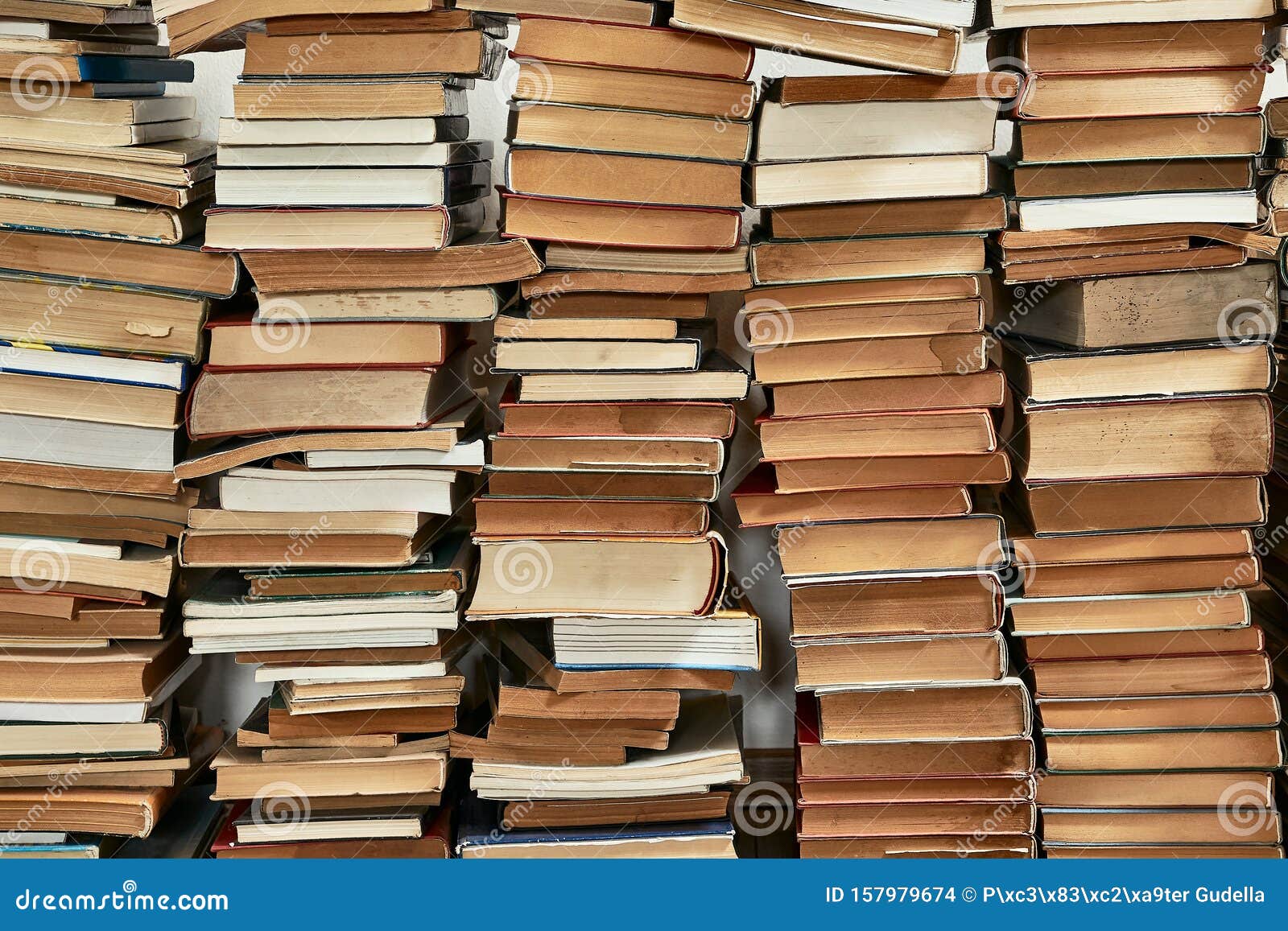 Wall of books piled up stock photo. Image of dusty, antique - 157979674