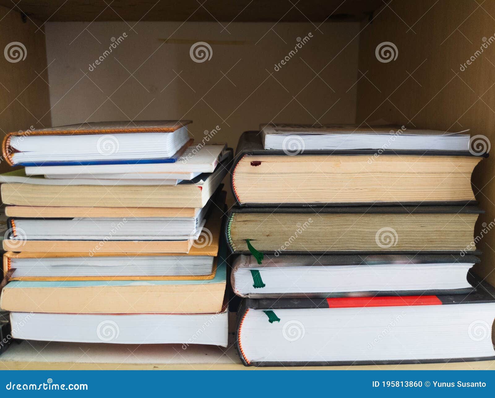 A Pile of Books in a Bookshelf Stock Photo - Image of college, book ...