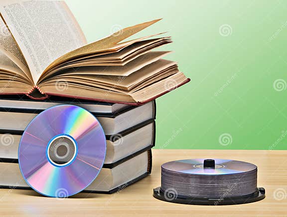 Pile of books and DVD stock photo. Image of library, education - 10317816