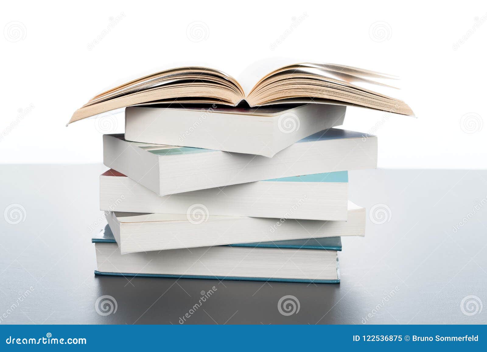 Stack of Books Lying on Grey Table Stock Image - Image of page ...