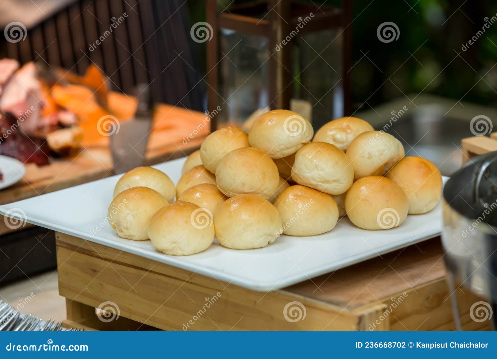 Pile bread buns in plate. stock photo. Image of bread - 236668702