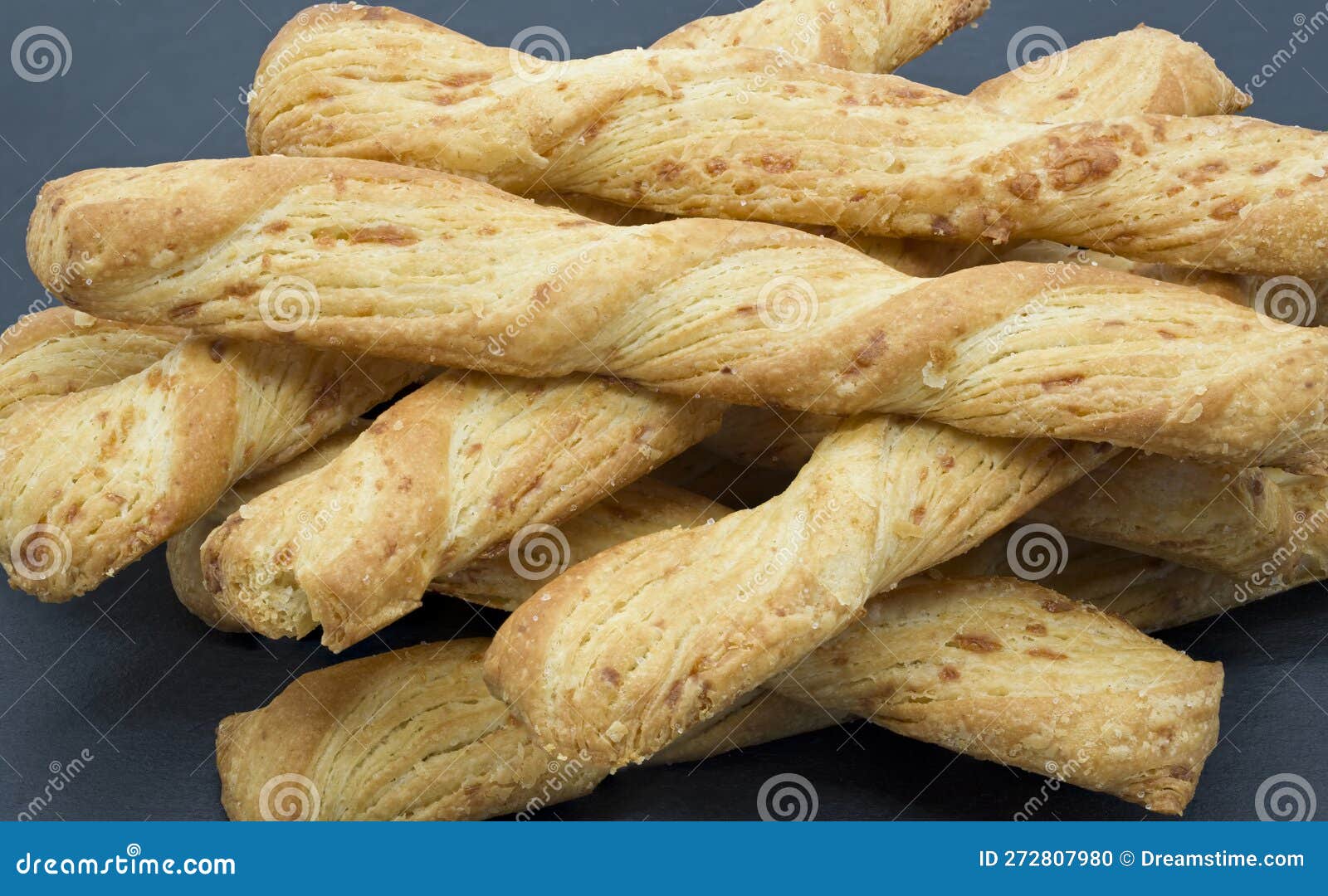 A Pile of Bread Cheese Flavoured Sticks Piled on Top of Each Other ...