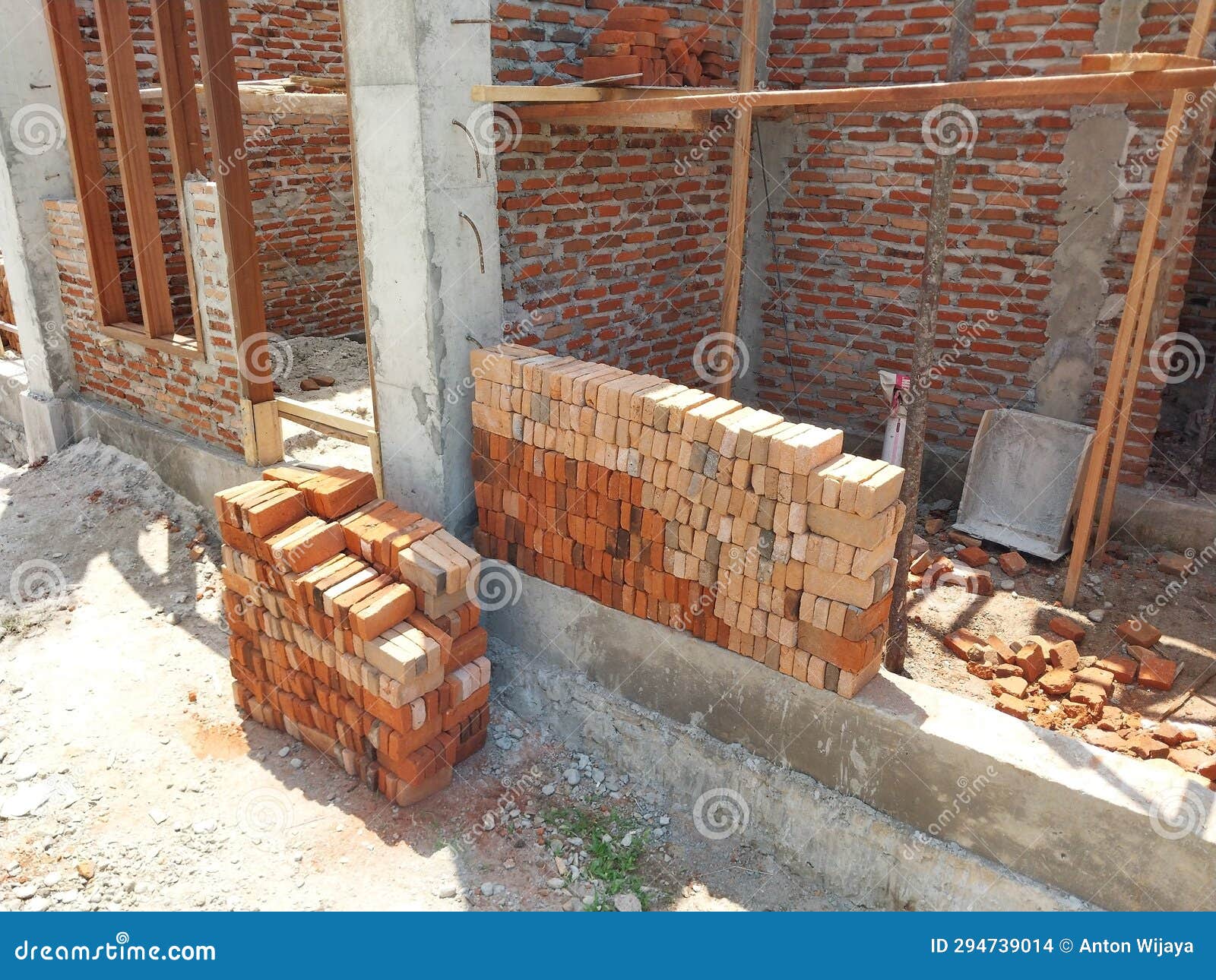 Building Under Construction. a Pile of Brick at Construction Site Stock ...
