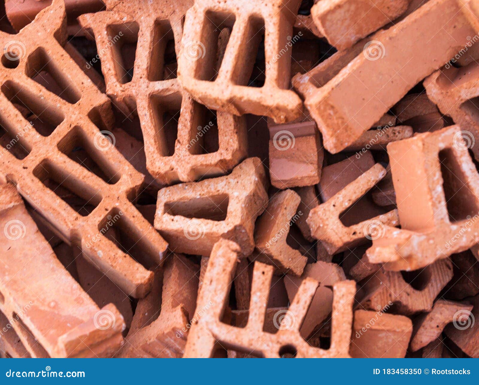 Pile of broken bricks stock photo. Image of crushed - 183458350
