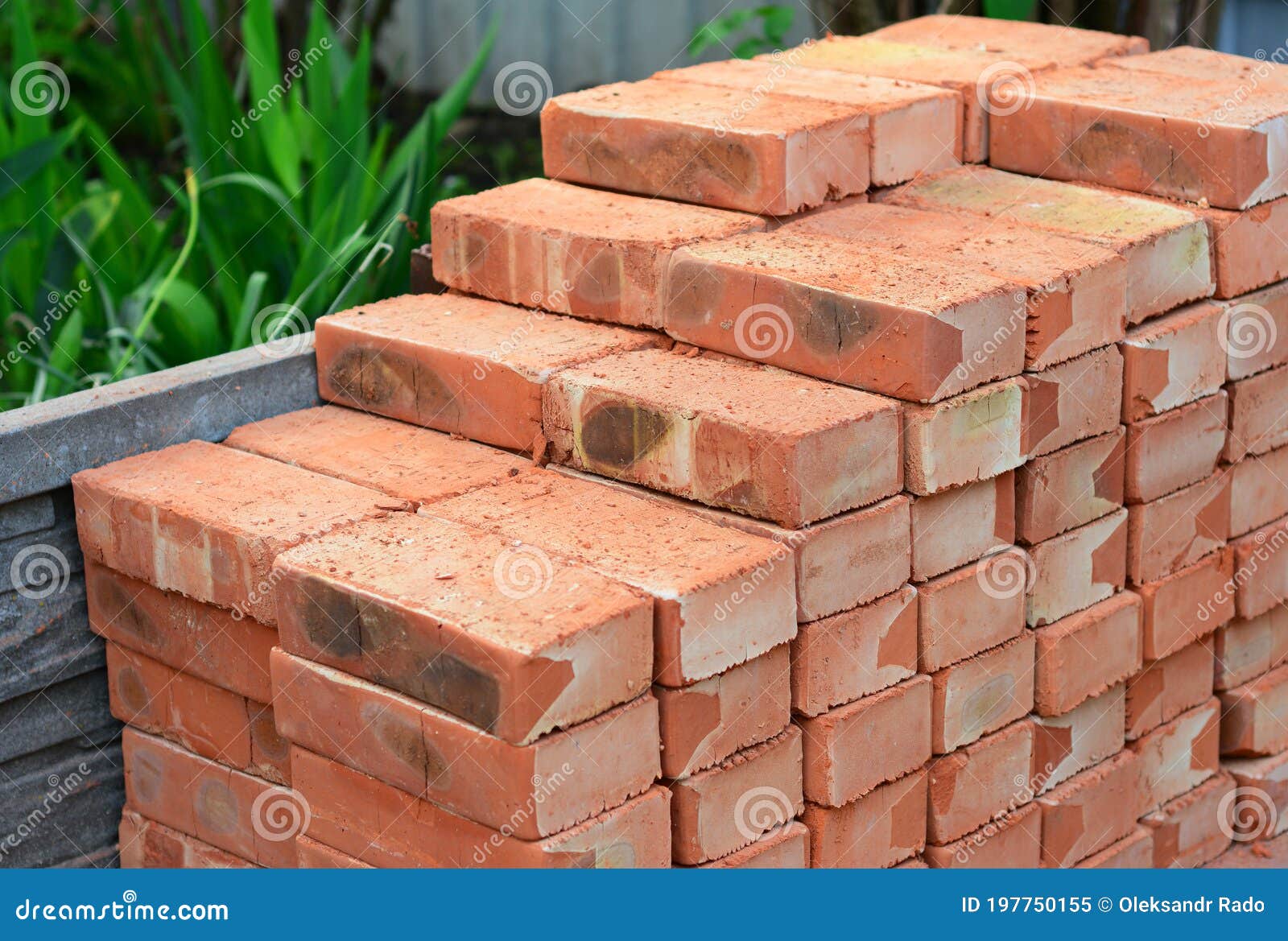 A Pile of Building Materials, Stack of New Red Bricks for Construction ...