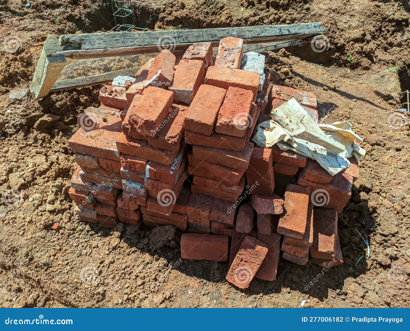 A Pile of Building Materials, a Stack of Red Bricks for Construction is ...