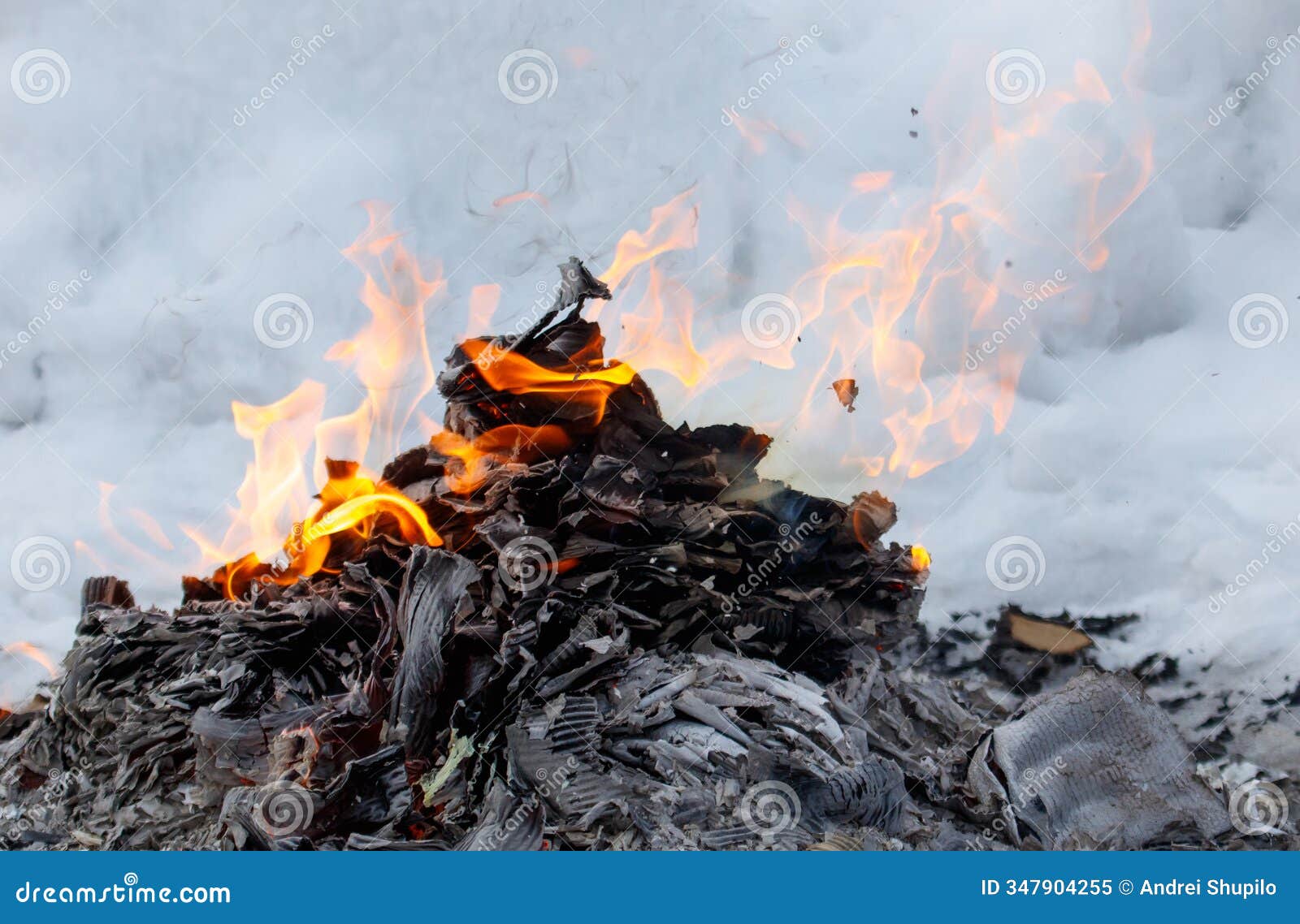 A Pile of Burned Paper with a Fire in the Middle Stock Image - Image of ...