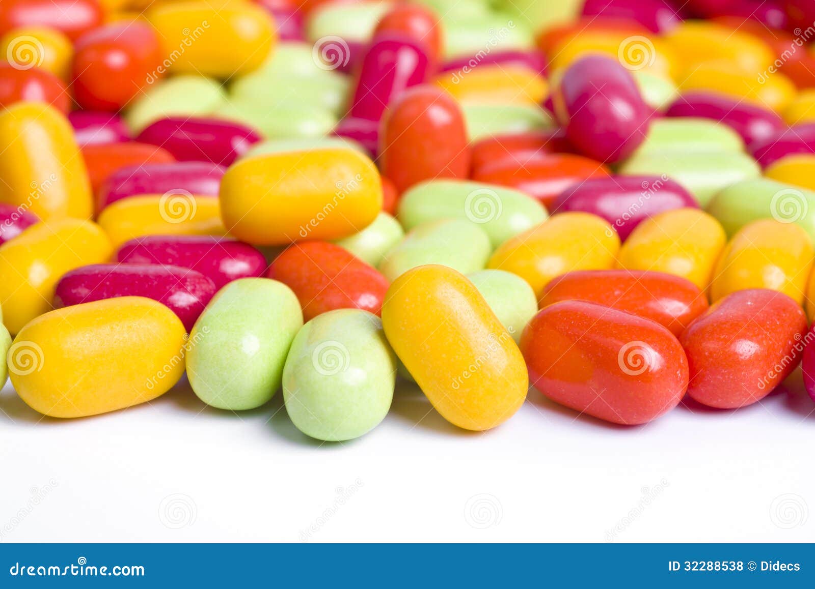 Pile of candy buttons stock photo. Image of icing, pill - 32288538