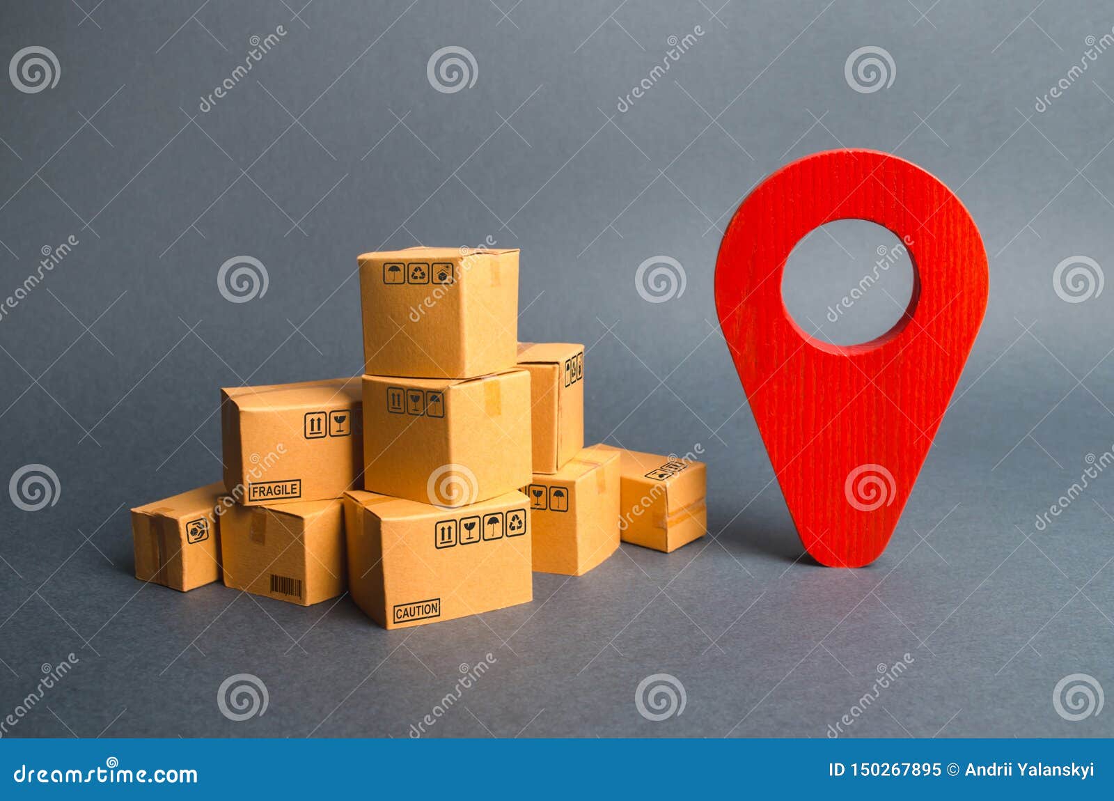 A Pile of Cardboard Boxes and a Red Position Pin. Locating Packages and ...