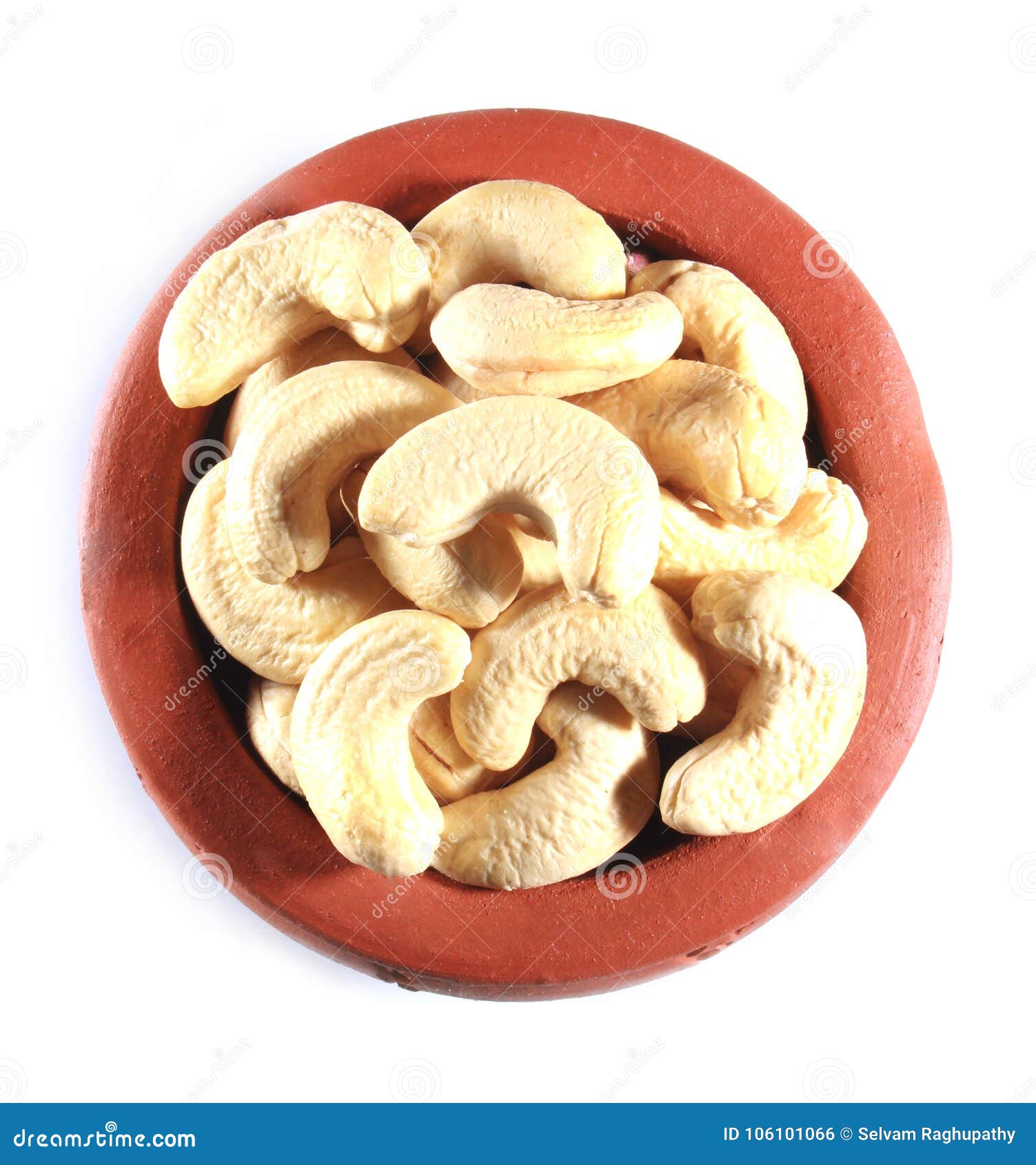 Cashew nuts in a clay bowl stock photo. Image of healthy - 106101066