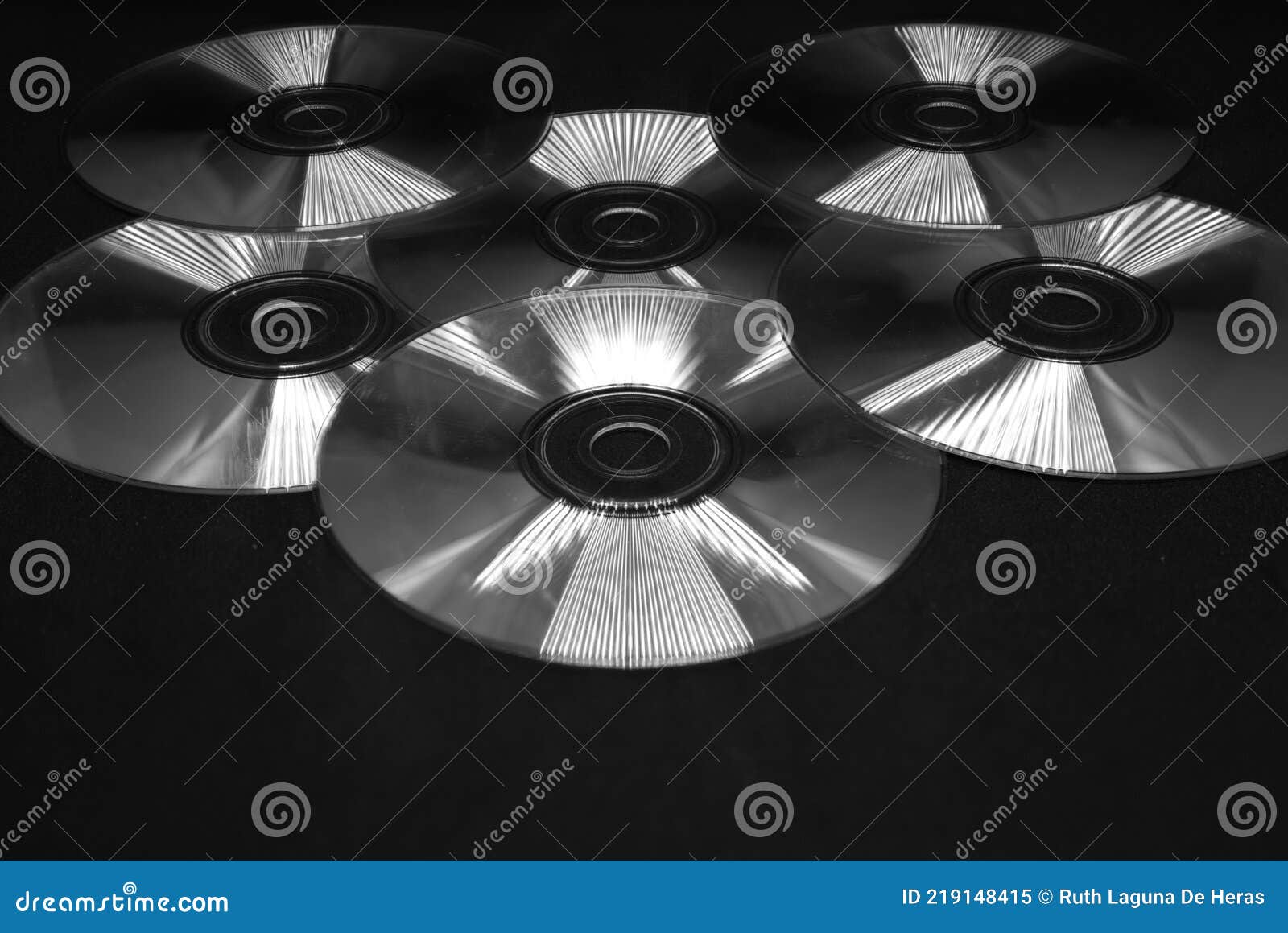 A pile of cd rom on black stock image. Image of prism - 219148415