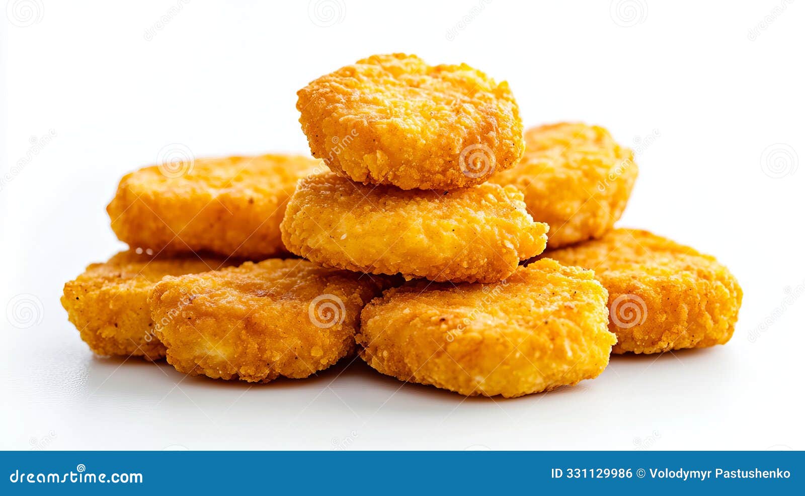 A Pile of Chicken Nuggets Sitting on Top of Each Other Stock Photo ...