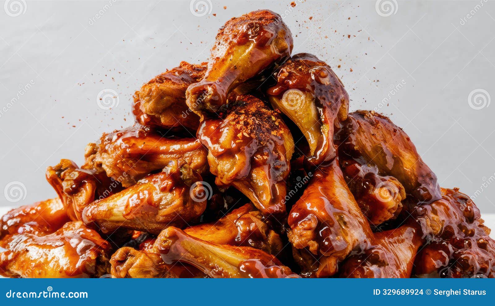 A Pile of Chicken Wings Covered in Sauce and Sitting on a Table, AI ...