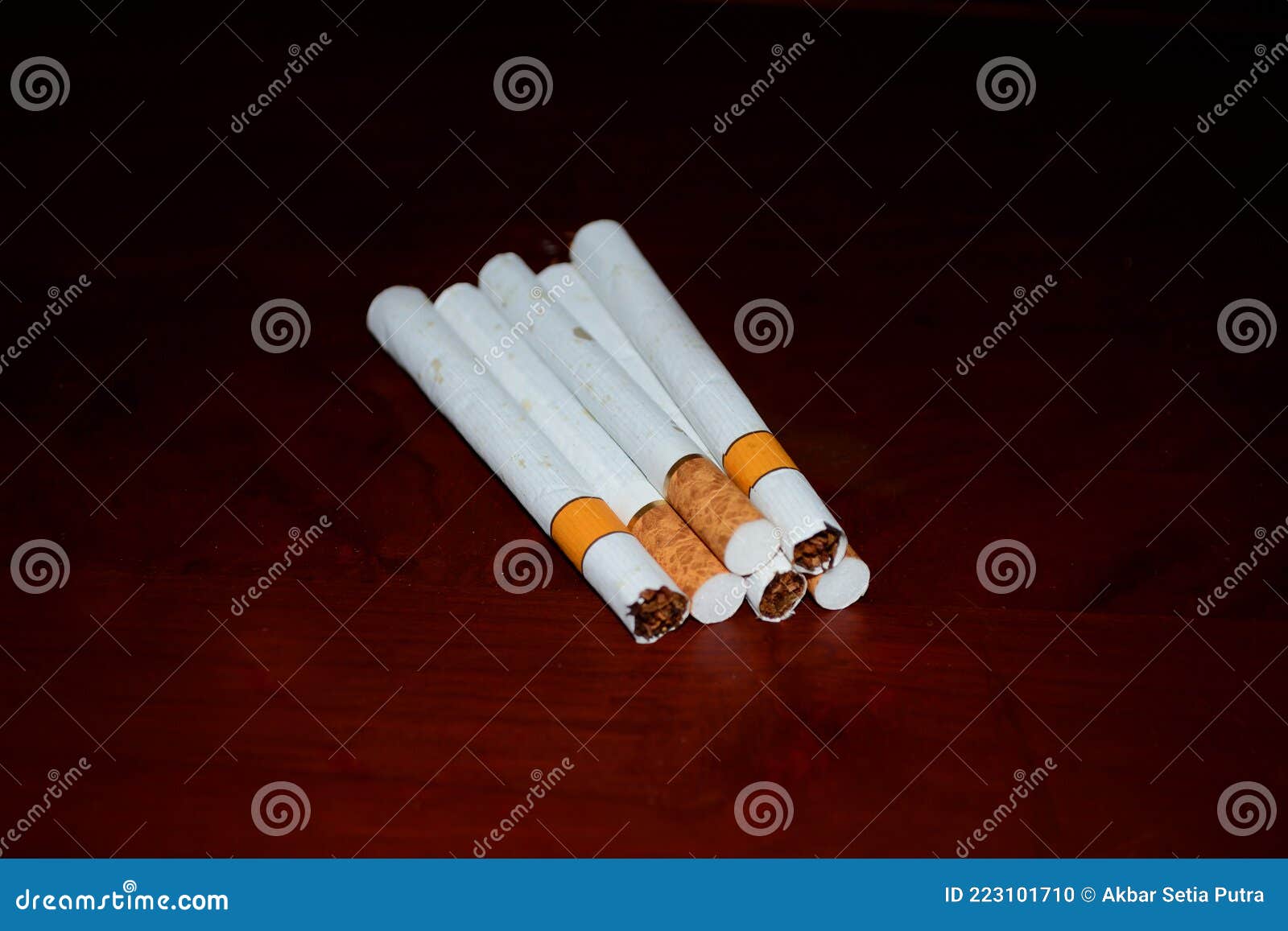 Pile of cigarettes stock photo. Image of habit, smoke - 223101710