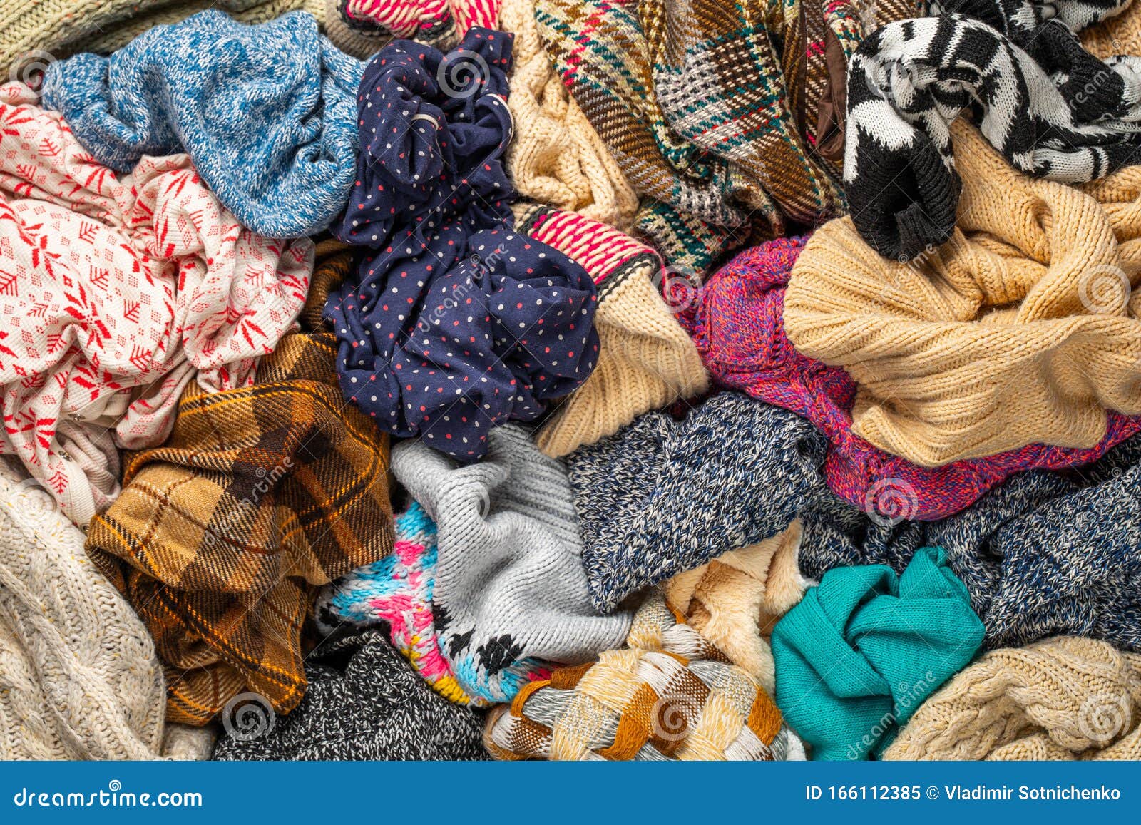 Pile of Clothes Background stock image. Image of laundry - 166112385