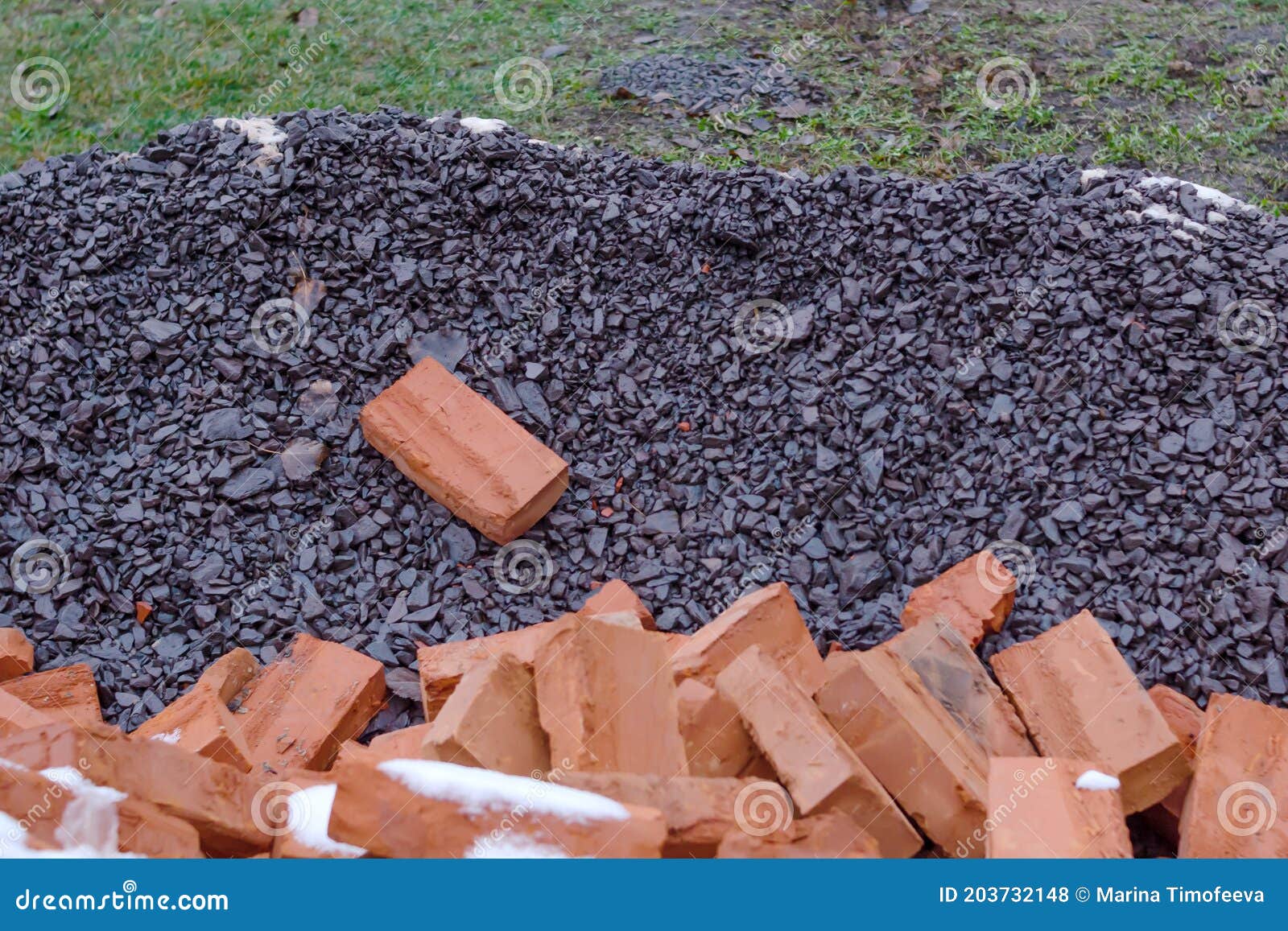 A Pile of Coal and Old Red Bricks Lie on the Outdoor Stock Photo ...