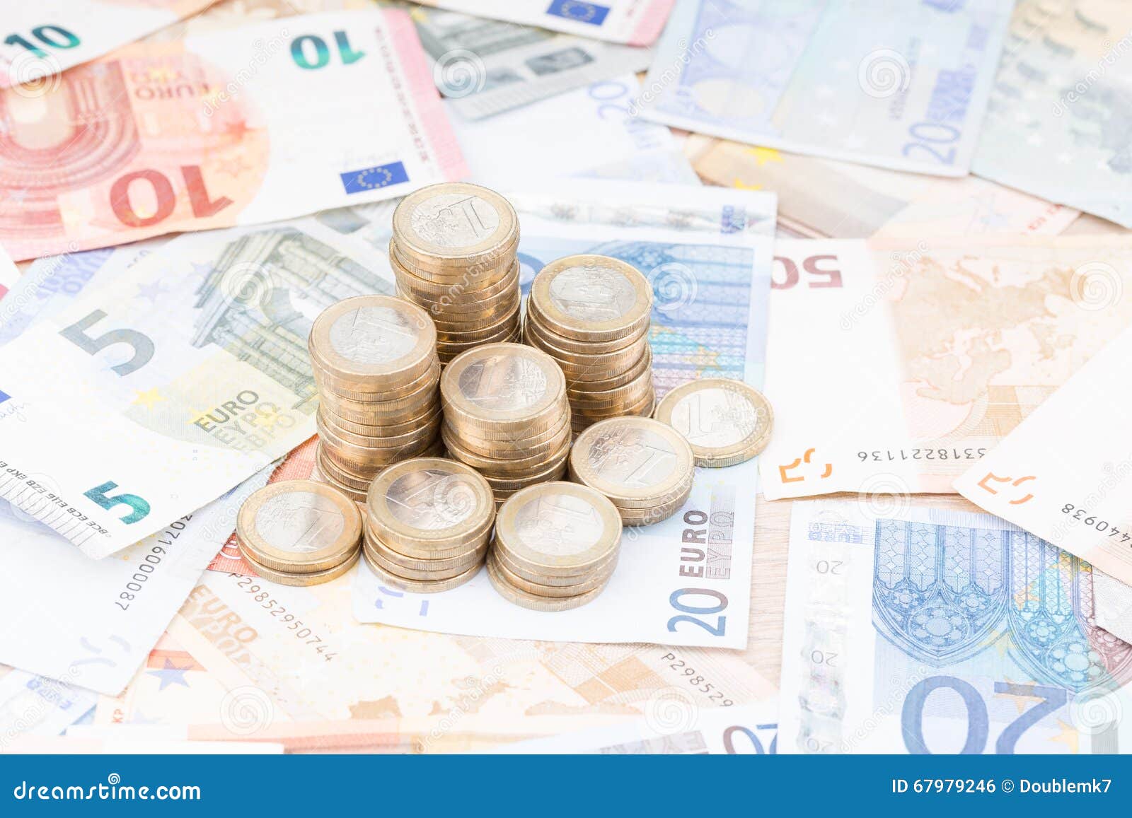 Pile of Coins on Bank Notes Stock Photo - Image of cash, notes: 67979246