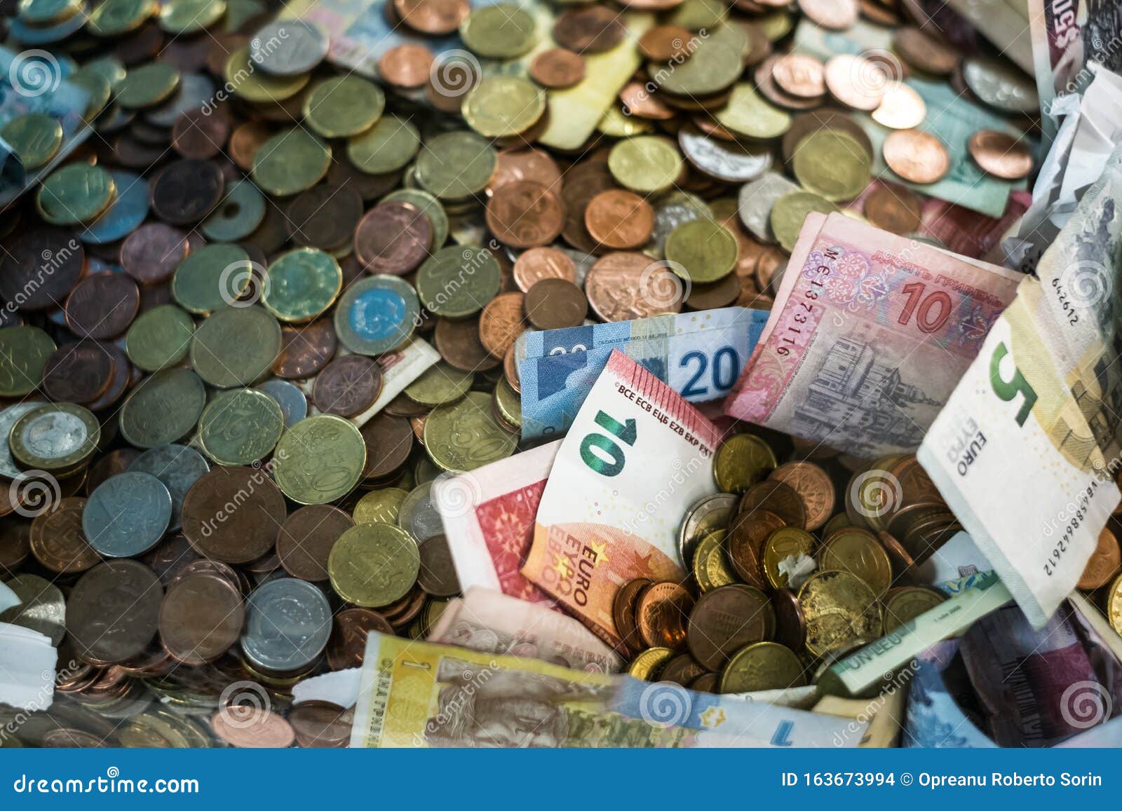Pile of Coins and Banknotes from Different Countries Stock Photo ...