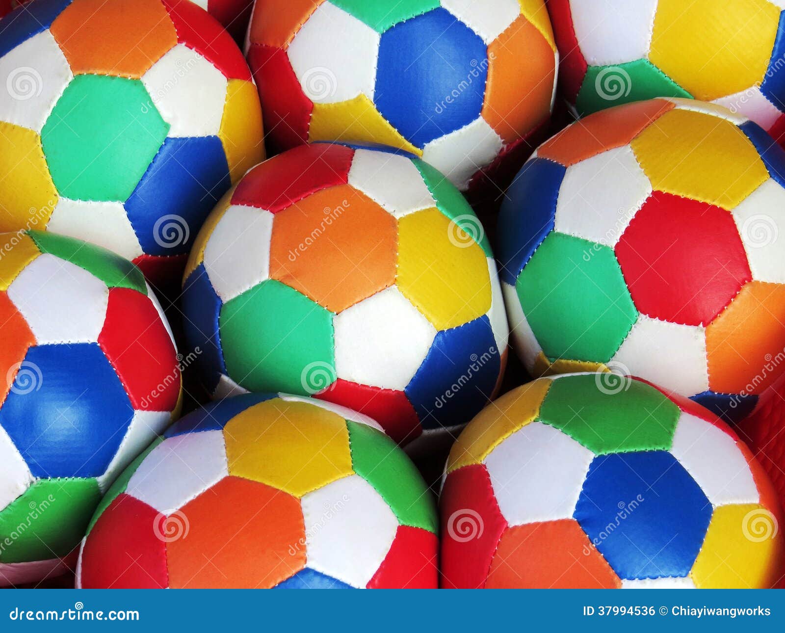 A pile of colored football stock photo. Image of texture - 37994536