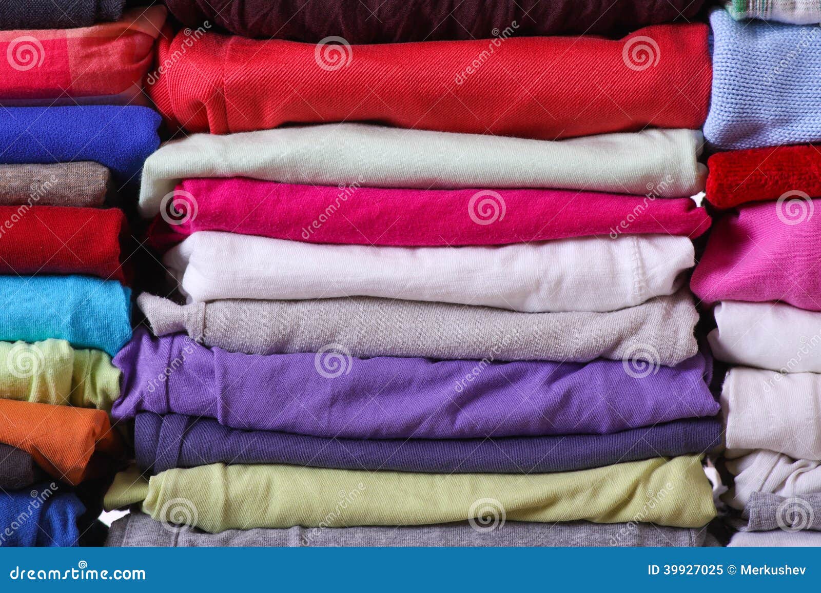 Pile of colorful clothes stock image. Image of folded - 39927025