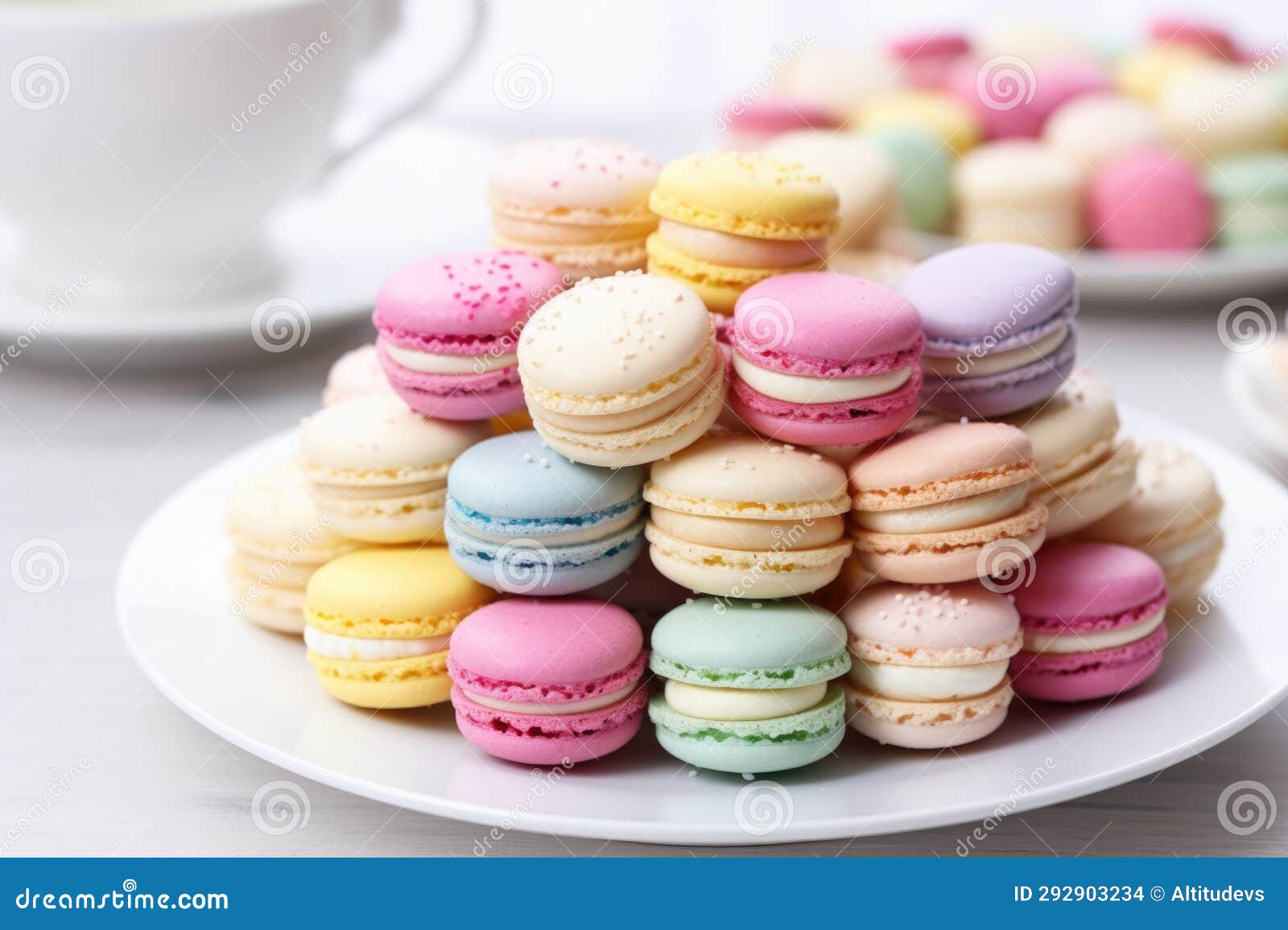 A Pile of Colorful Macarons on a White Plate Stock Photo - Image of ...
