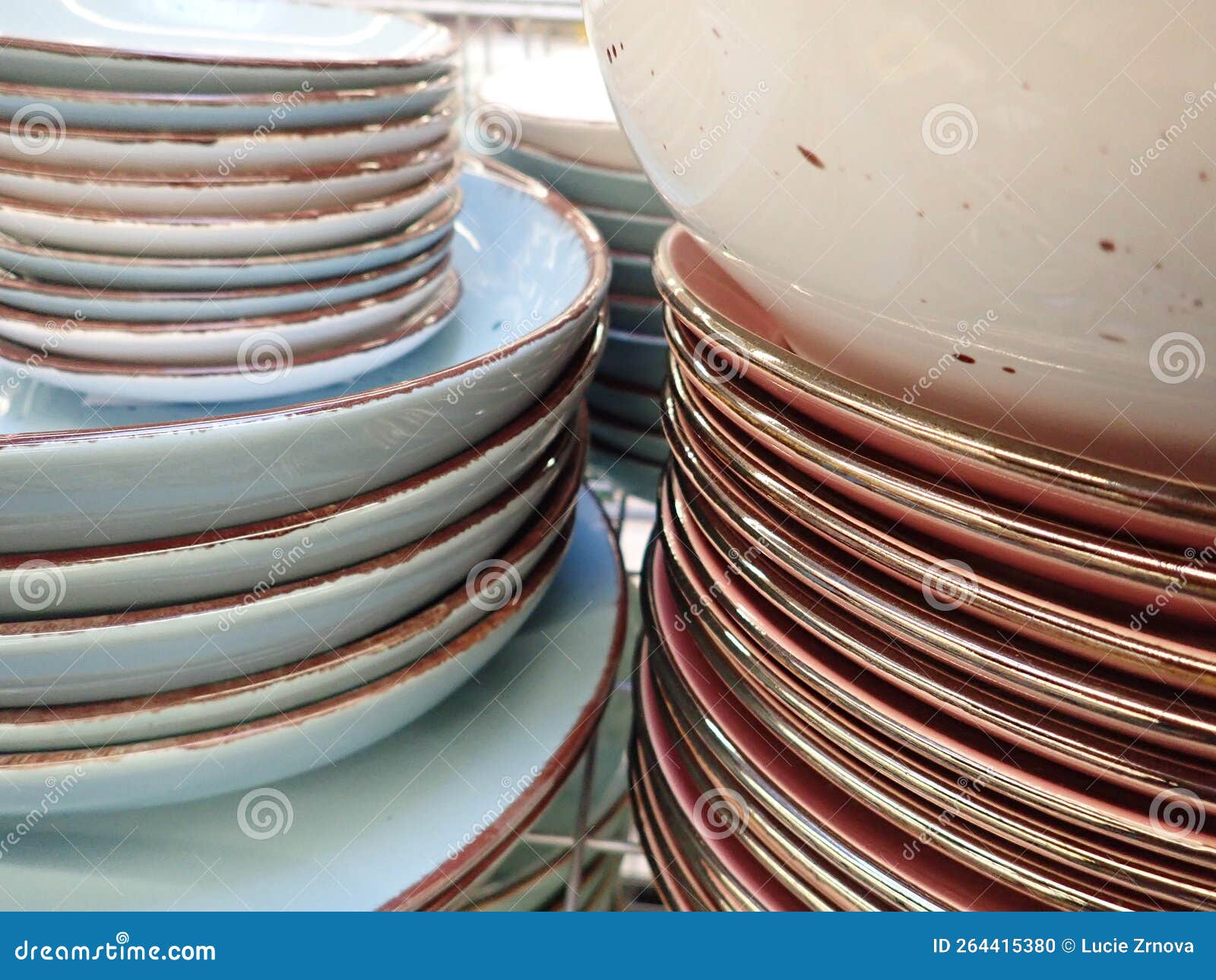 Pile of Colorful Plates in Kitchen Stock Photo - Image of dishes ...