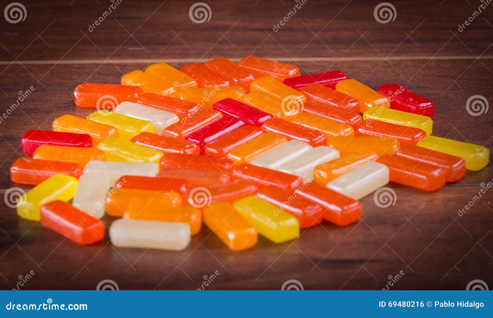 Pile of Colorful Rectangular Hard Candy Lying on Wooden Surface Stock ...