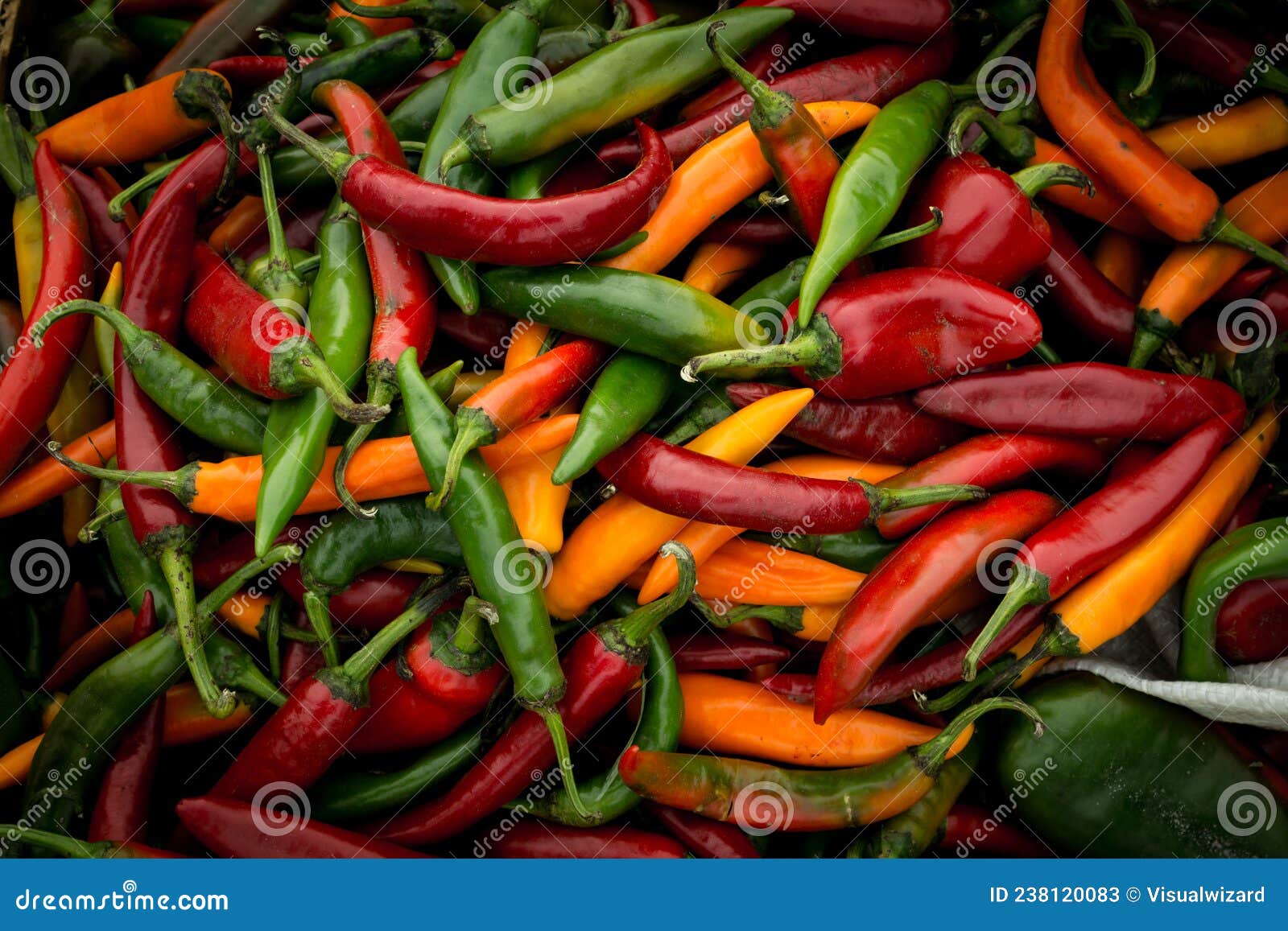 Pile of Colorful Red Orange Green Chilli Peppers Stock Image - Image of ...
