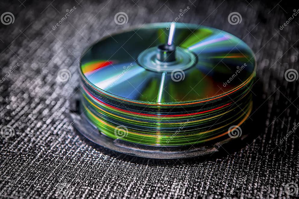 Pile of compact discs stock photo. Image of grey, circles - 105139304