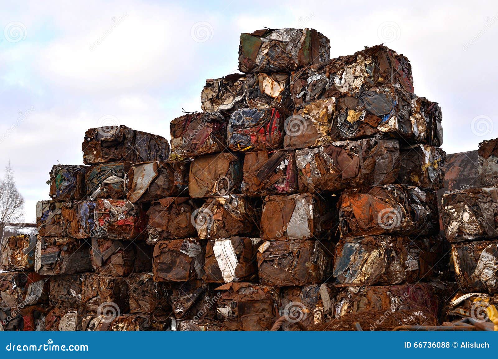 A Pile of Compressed Cars in Blocks for Processing Stock Photo - Image ...