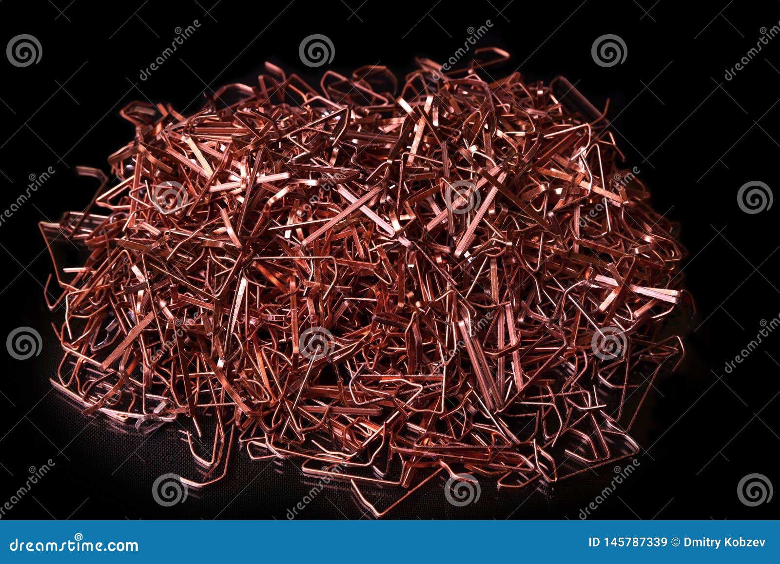 Pile of Copper Brackets on a Black Background Stock Image - Image of ...