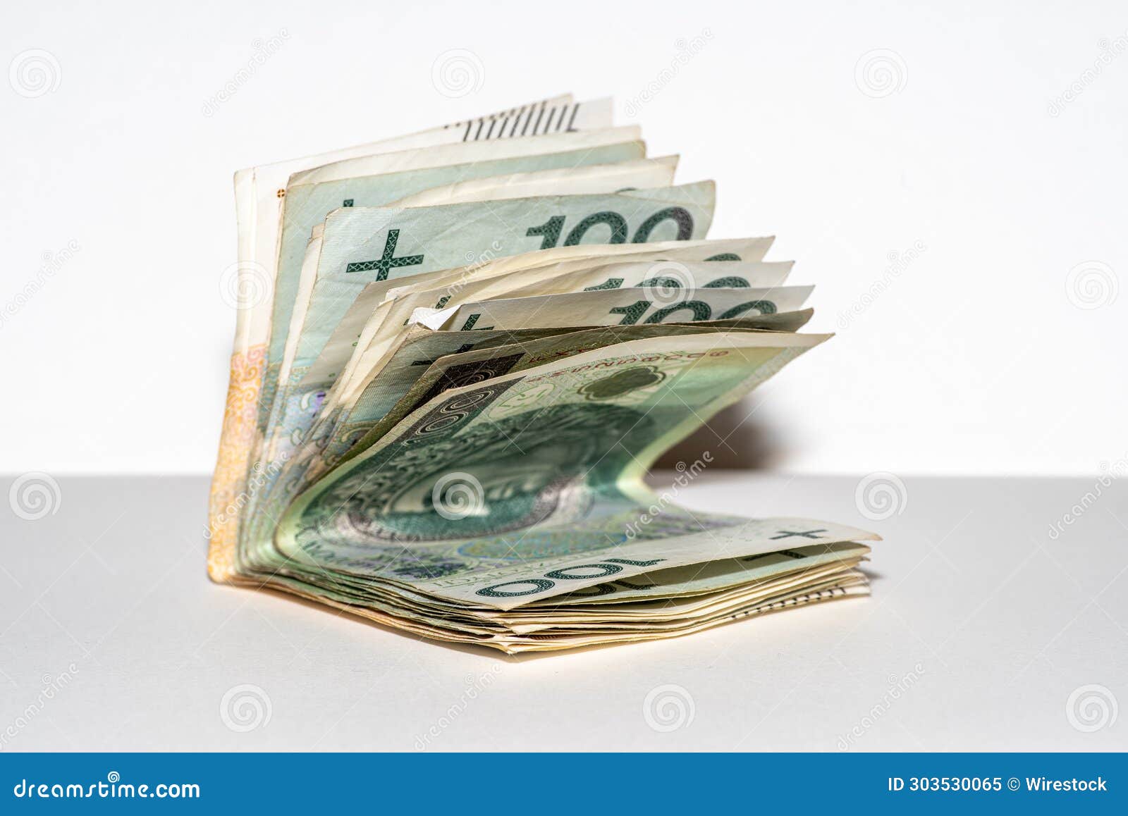 A Stack of 100 Dollar Notes Being Heldthiced Up Stock Image - Image of ...