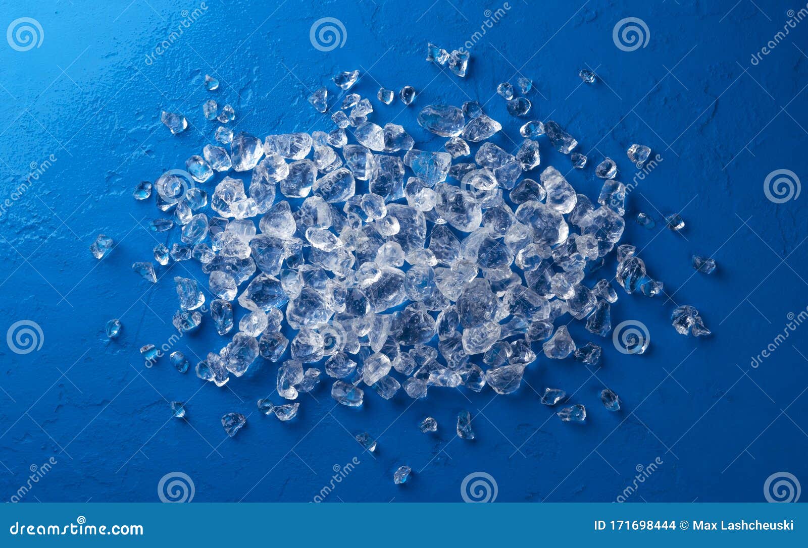 Pile of Crushed Ice on Blue Stone Background Stock Photo - Image of ...