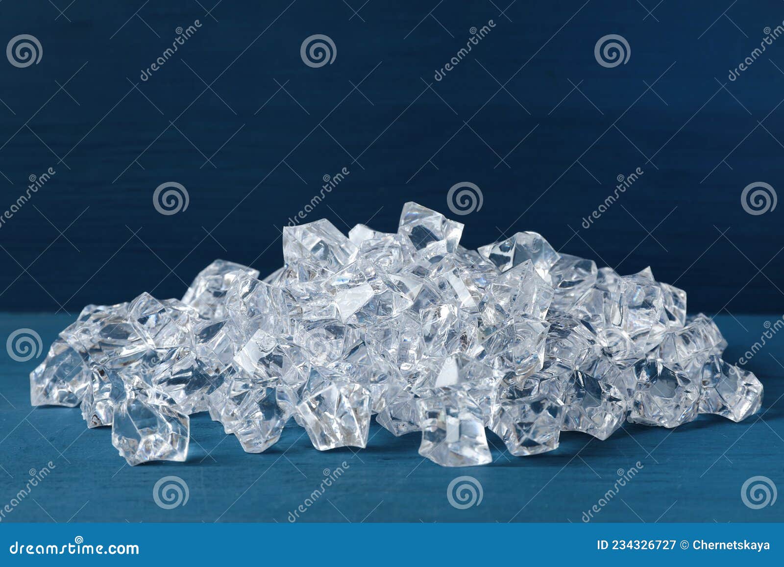 Pile of Crushed Ice on Blue Wooden Table Stock Image - Image of fresh ...
