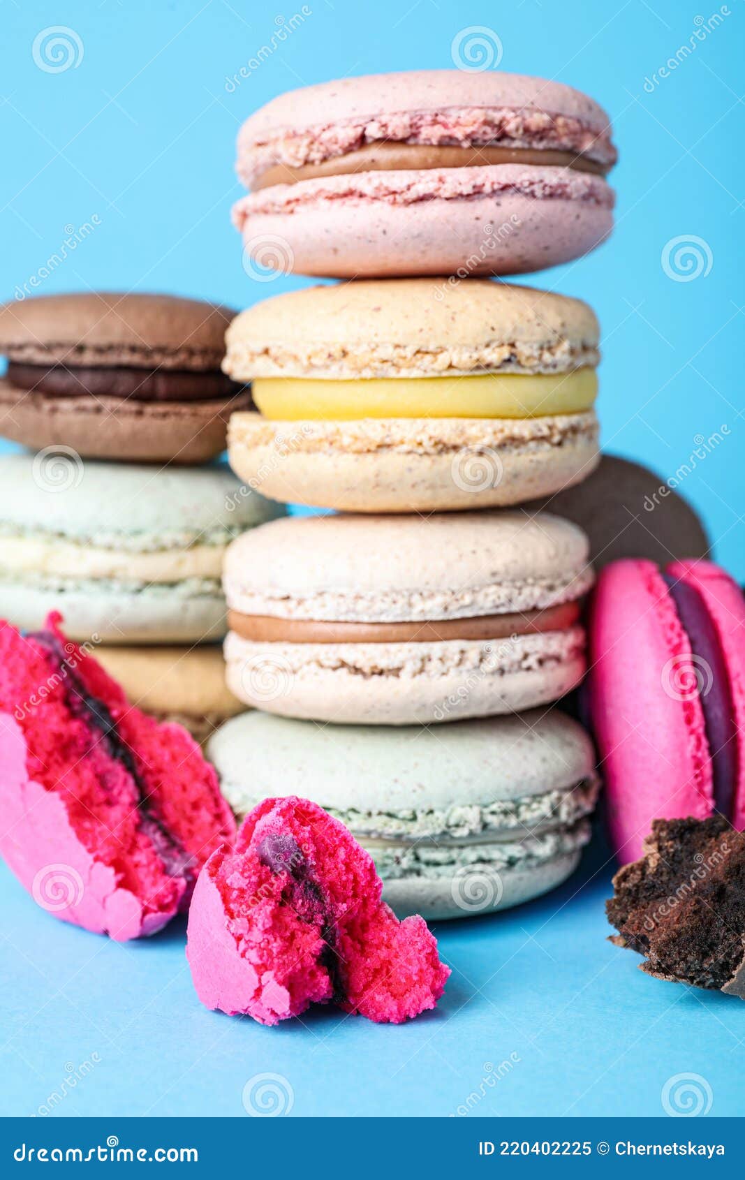 Pile of Delicious Colorful Macarons on Light Blue Background Stock ...